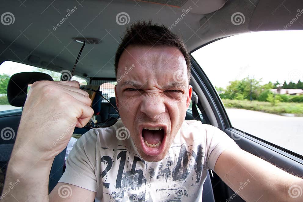 Aggressive car drivers stock image. Image of aggression - 14483859