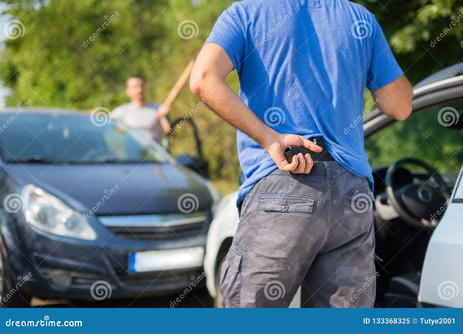 Aggressive Drivers Attacking Each Other with Weapons in Traffic on Road ...