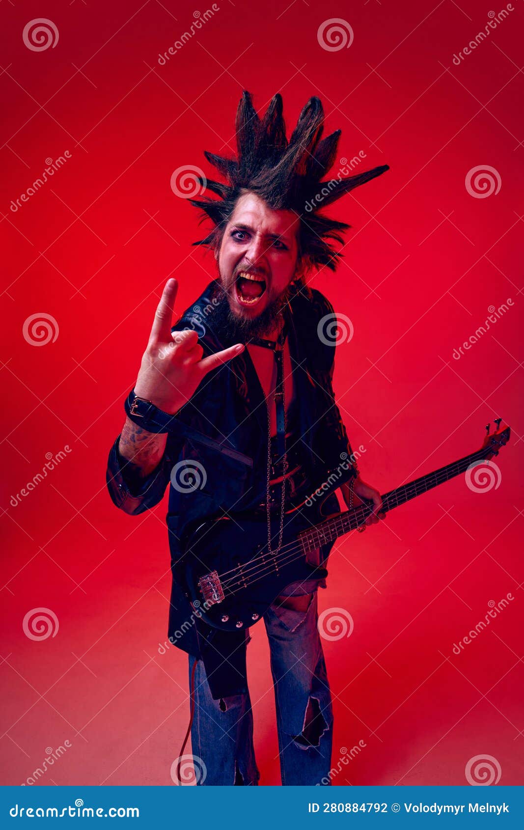 Aggressive Impressive Pose. Rok Musician, Man Posing with Hand Gesture ...