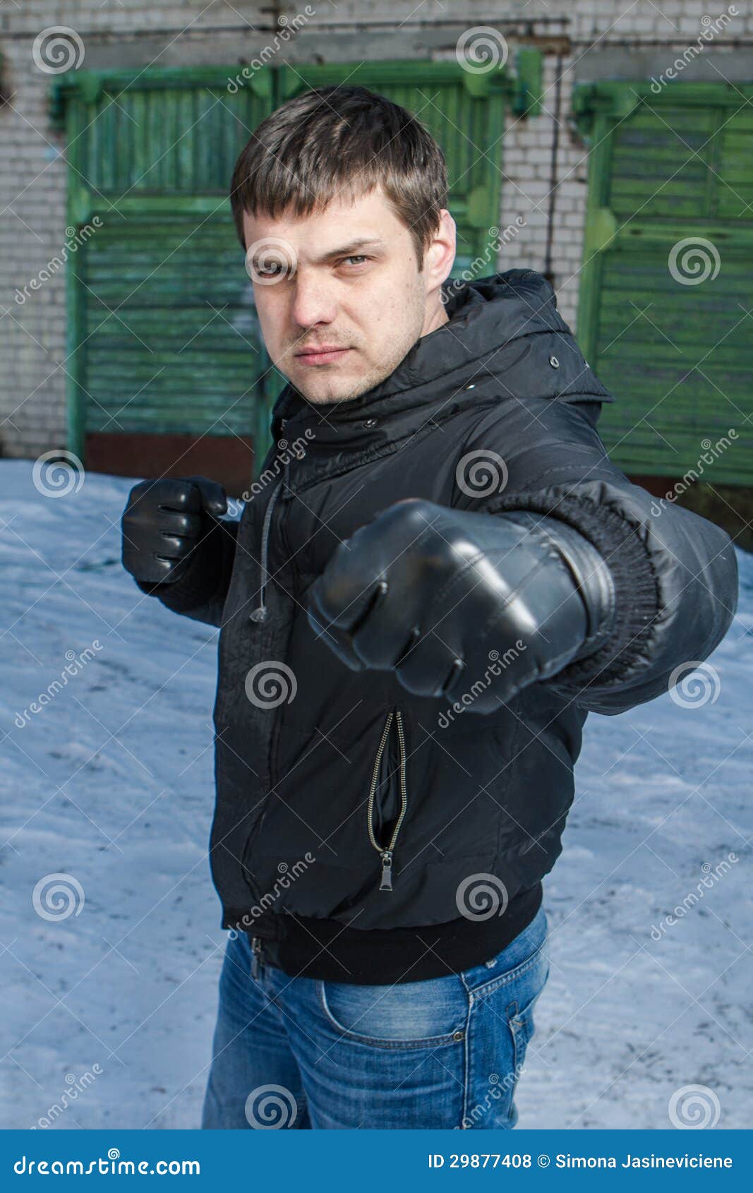Angry Man Punching in a Street Fight. Stock Photo - Image of ...