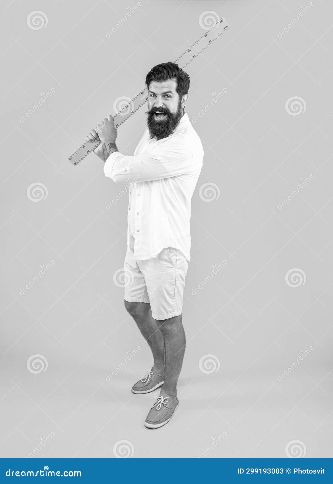 Aggressive Man with Measuring Ruler in Studio. Man with Measuring Ruler ...