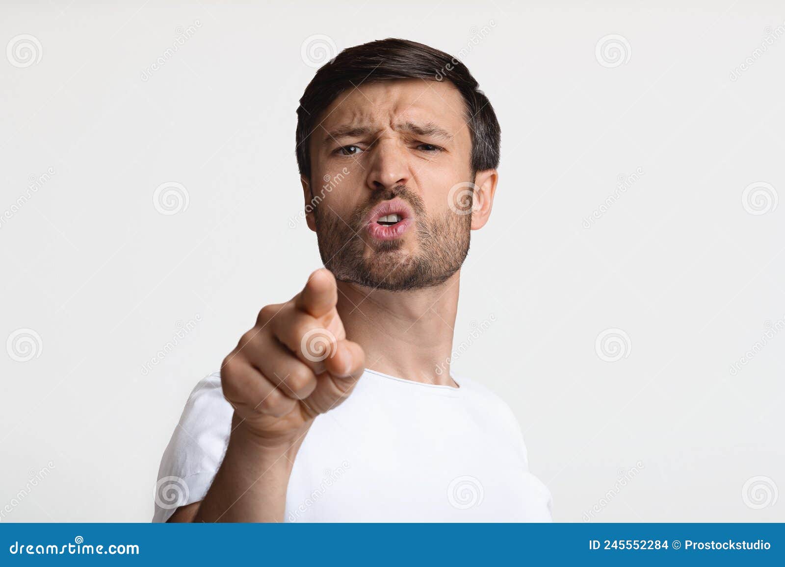 Aggressive Man Pointing Finger at Camera Blaming You, White Background ...