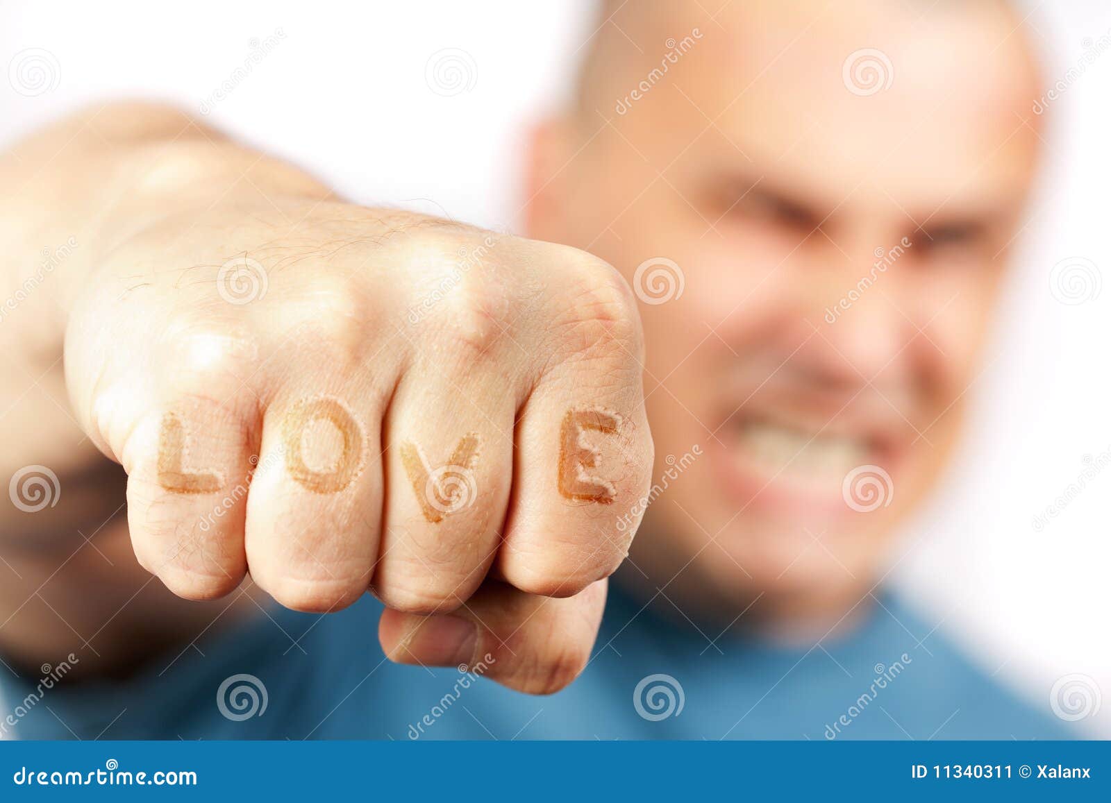 Aggressive Man with Words LOVE on His Knuckles Stock Image - Image of ...