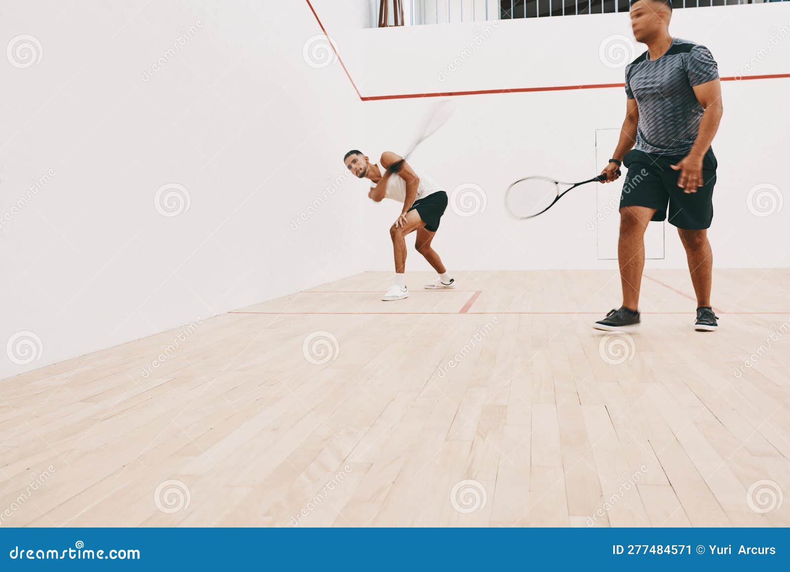 Agility is Your Best Friend in this Game. Two Young Men Playing a Game ...