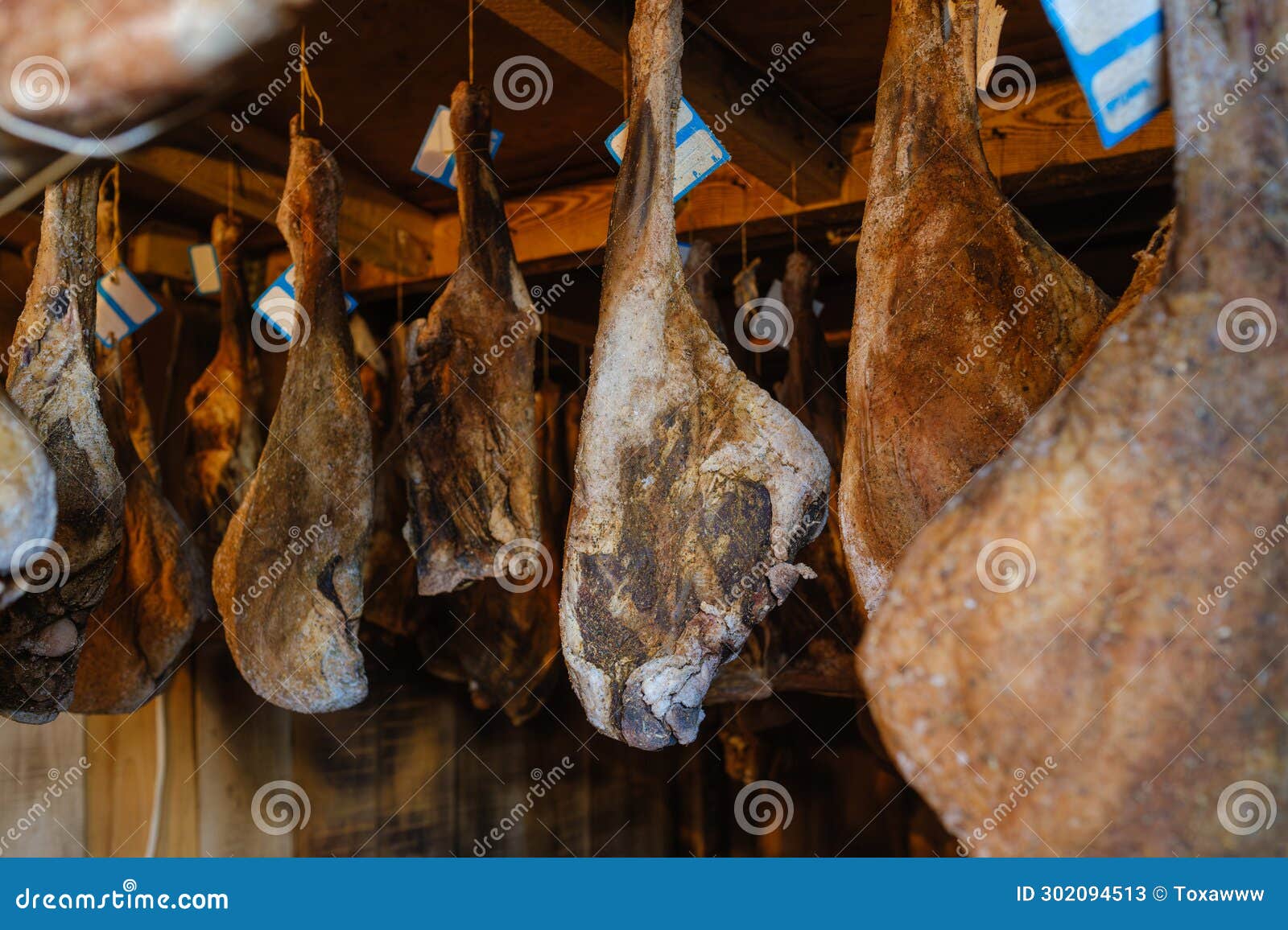 Aging Hams Hanging in Traditional Curing Room Stock Image - Image of ...