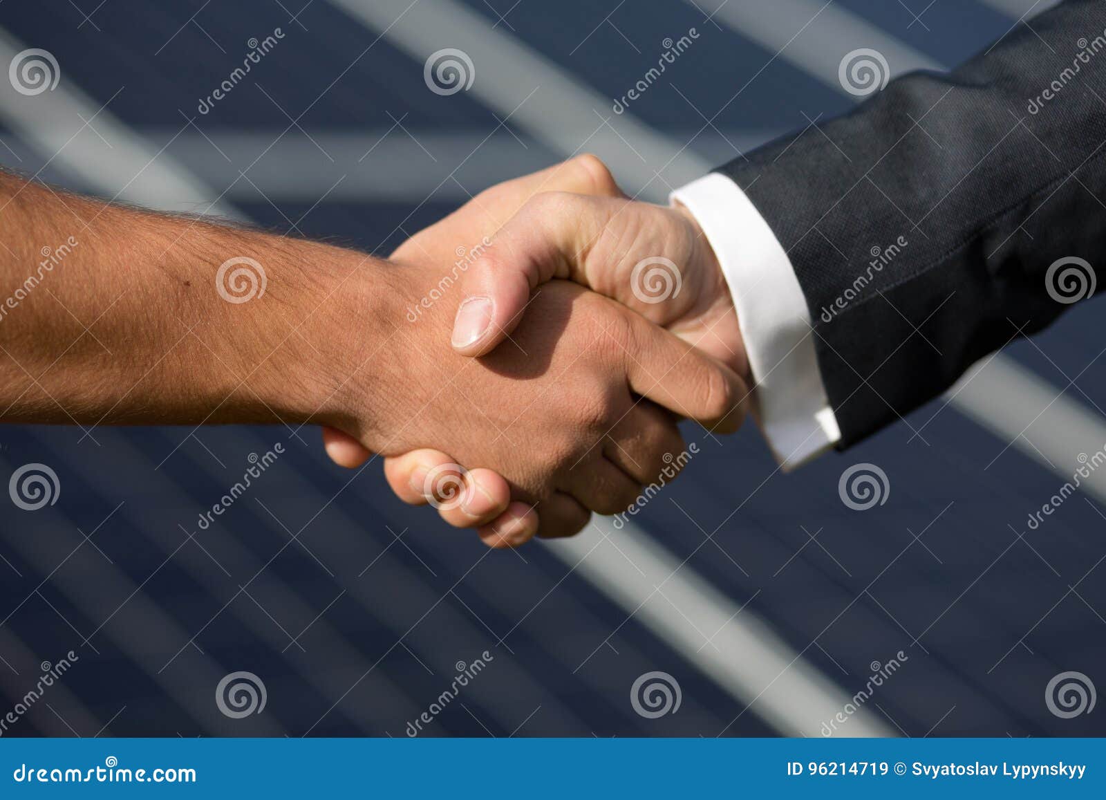 Agreeman Handshake, Solar Panel on Background. Stock Image - Image of ...