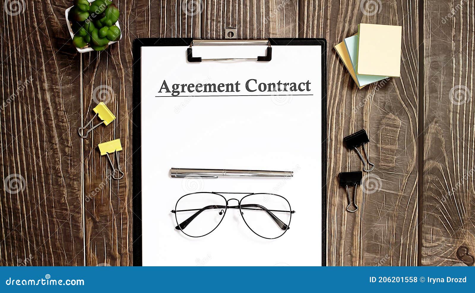 AGREEMENT CONTRACT Text Form on a Wooden Table with Office Tips Stock ...