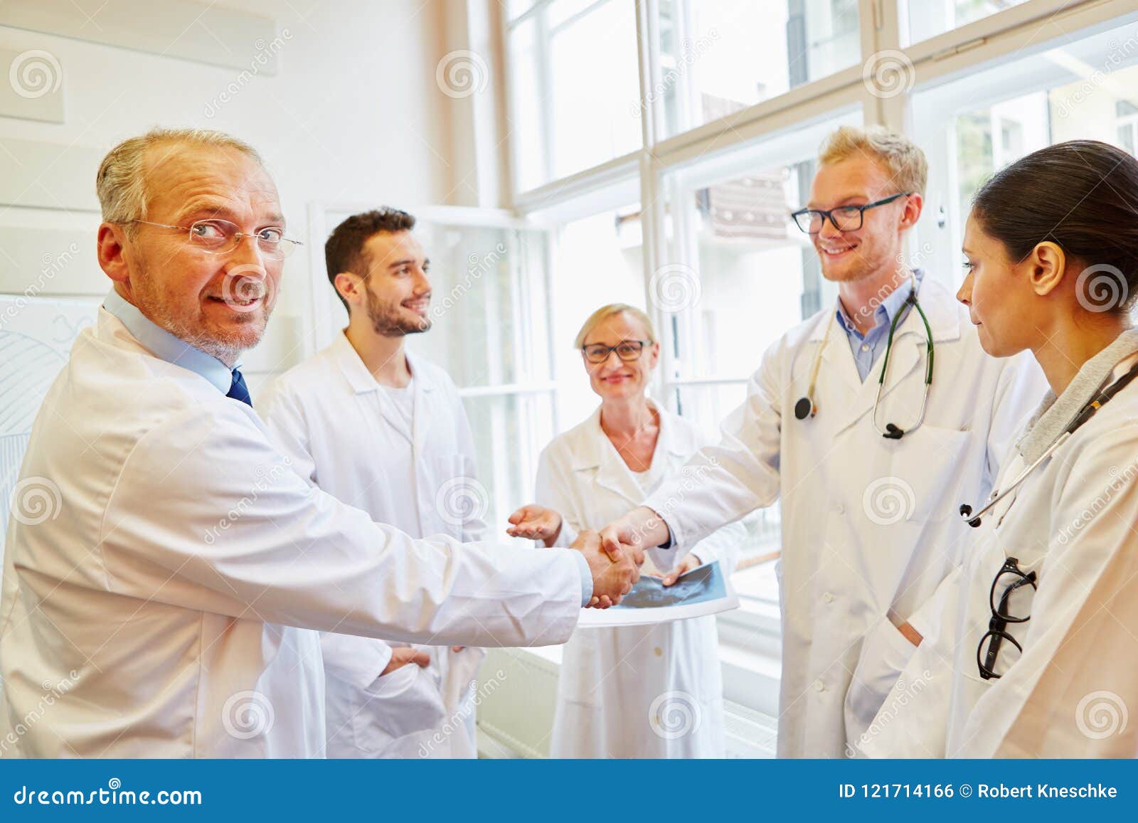 Agreement between Doctor and Physician Stock Photo - Image of smile ...