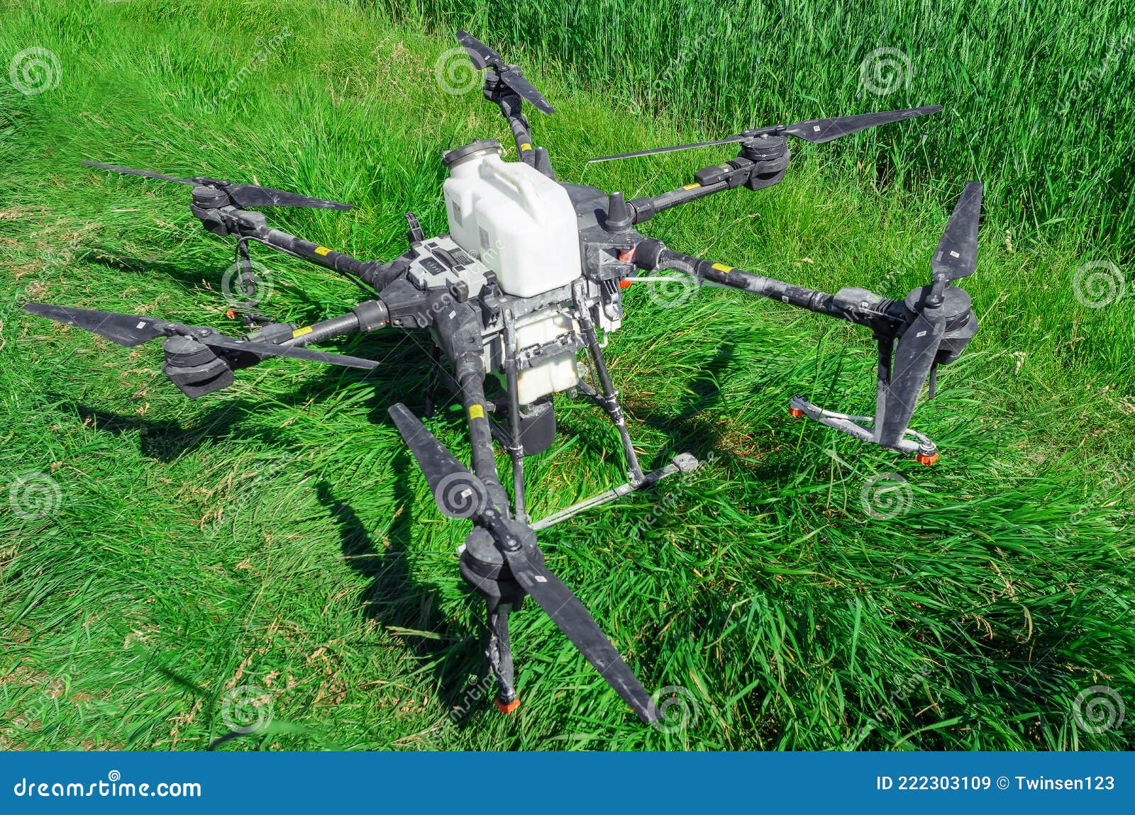 Agricultural Drone on Grass in Field before Spraying the Fields Stock ...