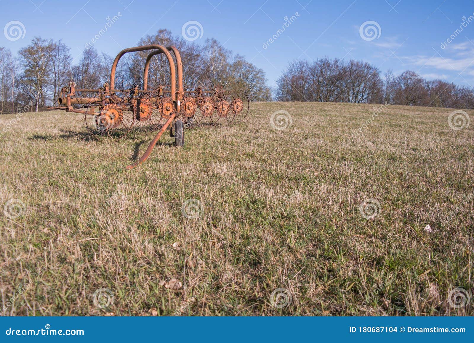 An Agricultural Machine for Raking Grass. Meadows on a Hill Stock Photo ...