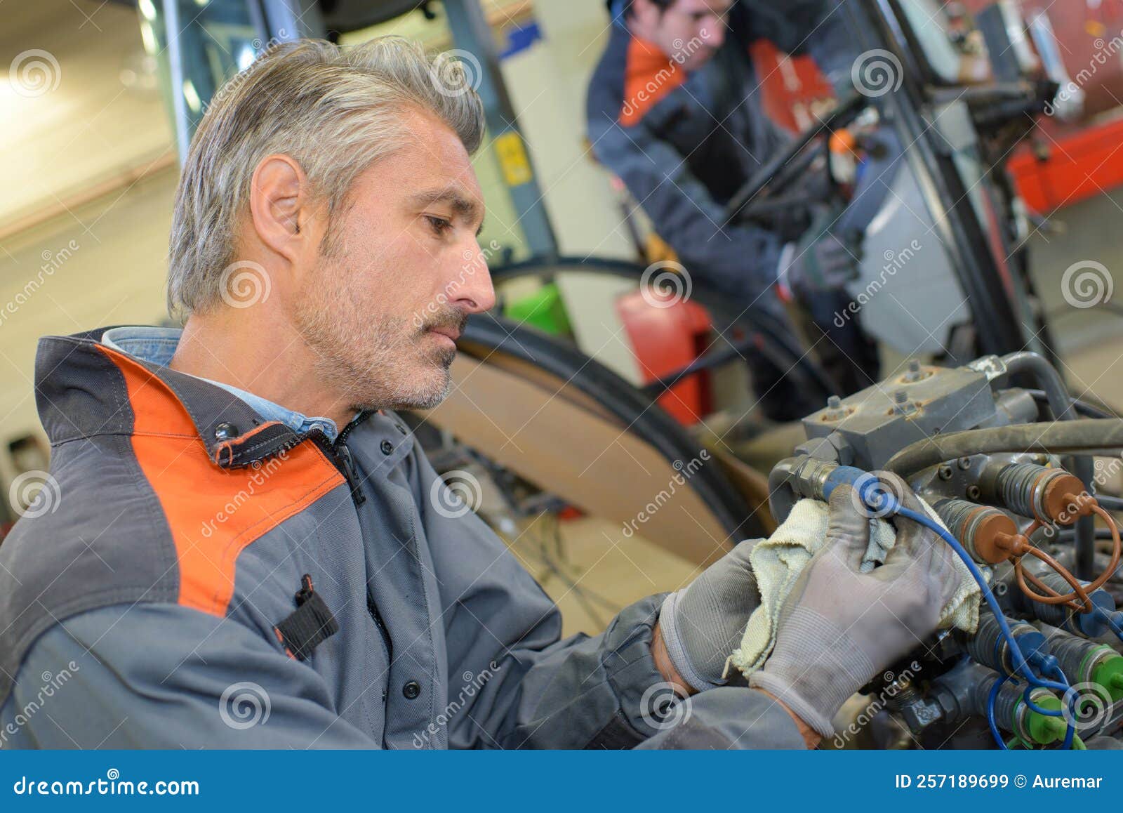 Agricultural Mechanic Connecting Wires Stock Image - Image of indoors ...