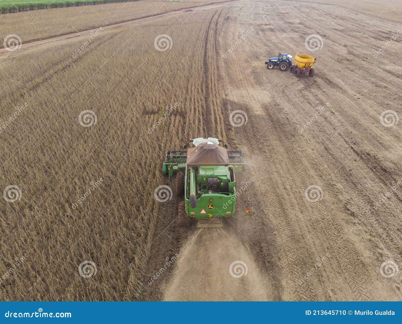 Tractor Harvesting Crop From The Field Editorial Photo | CartoonDealer ...