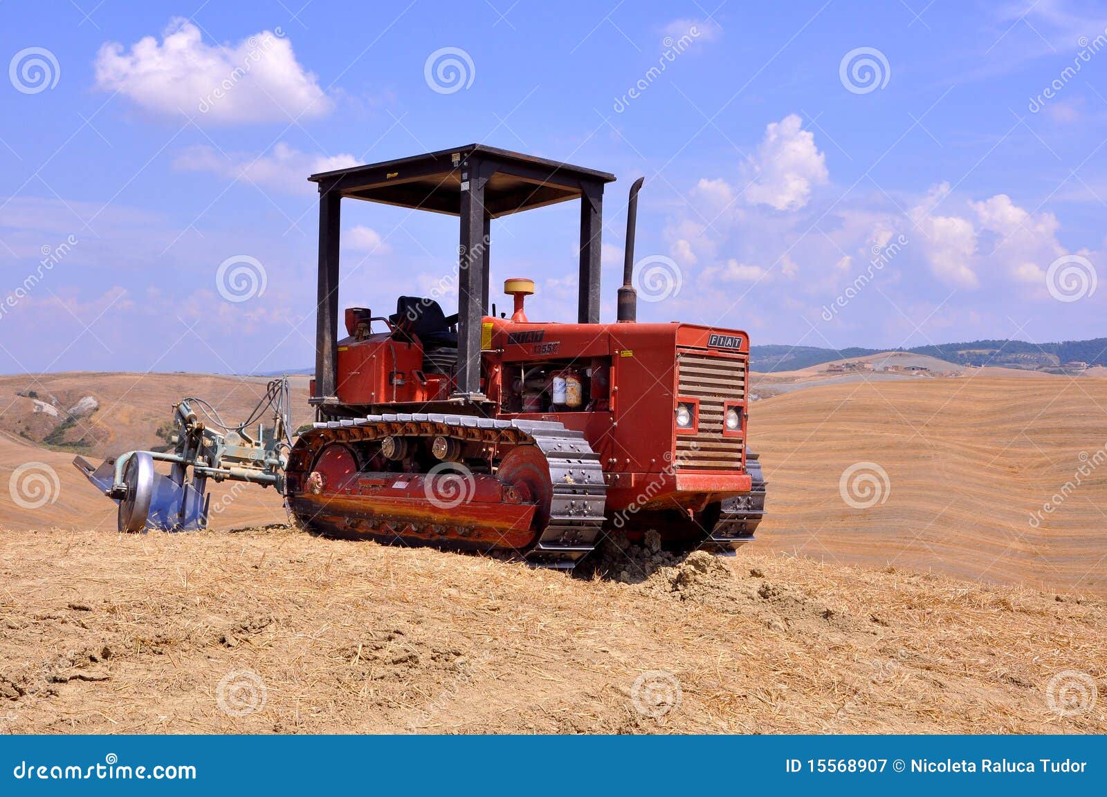 Agriculture in Italy with a Tractor on the Fields Editorial Photography ...