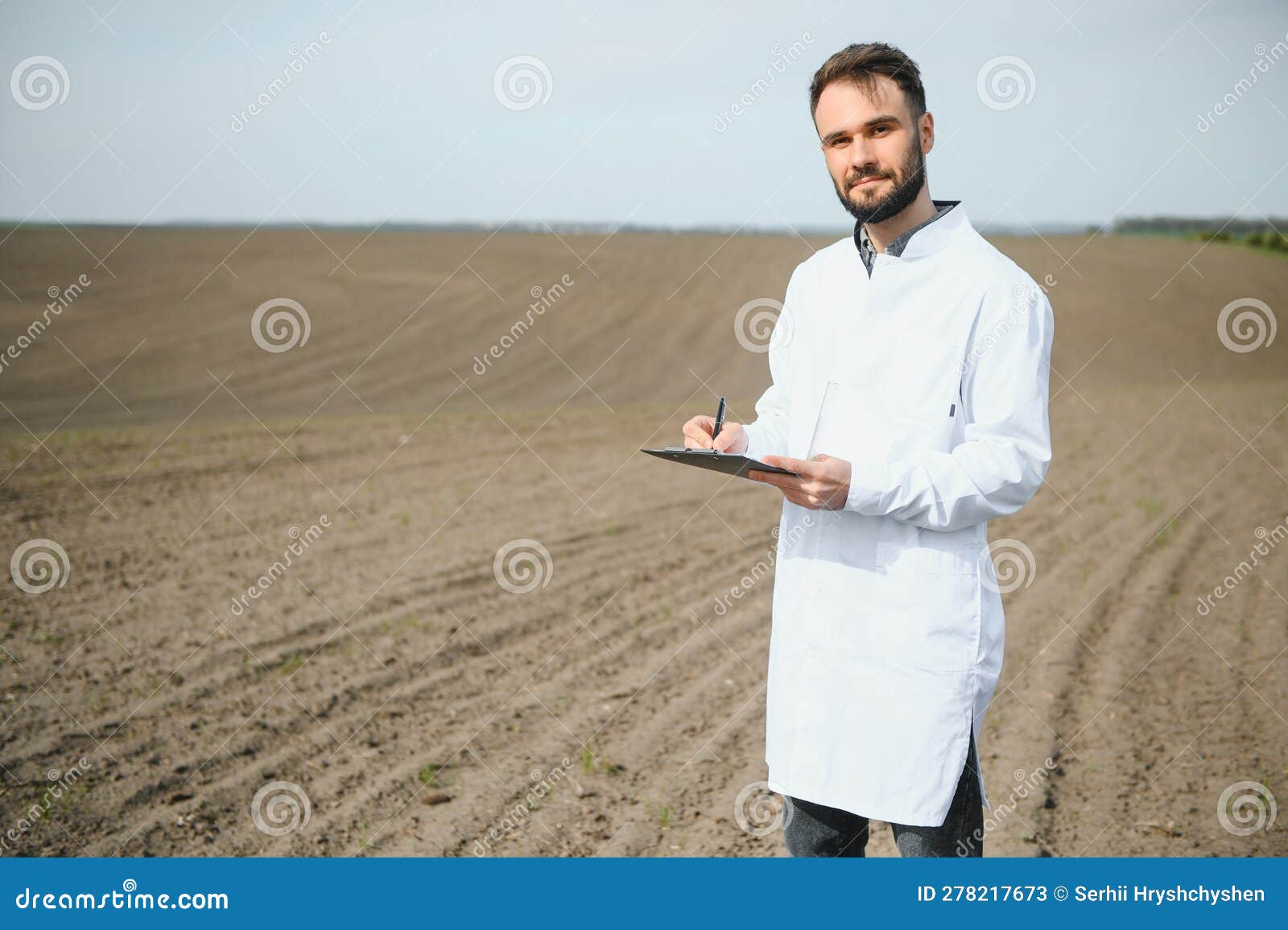 Agronomist Studying Samples of Soil in Field Stock Image - Image of ...