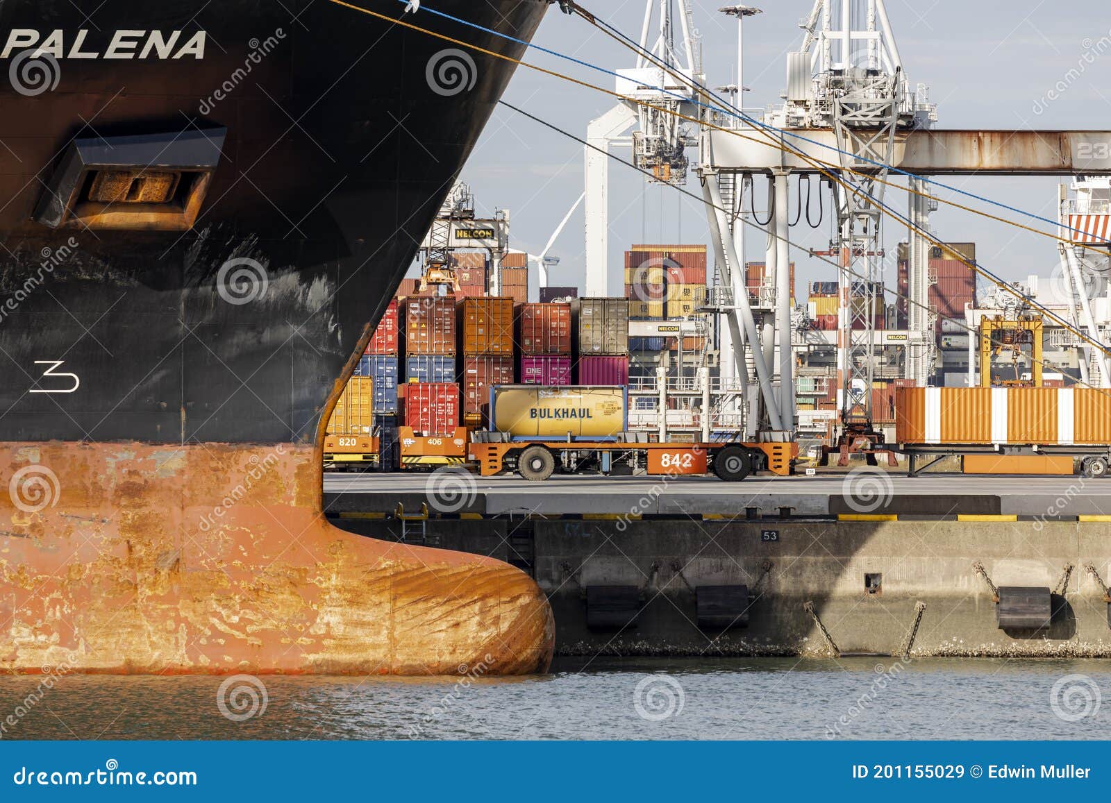 AGV Automated Guided Vehicle On Quay Alongside A Ship In The Port Of ... AGV Automated Guided Vehicle On Quay Alongside A Ship In The Port Of ...