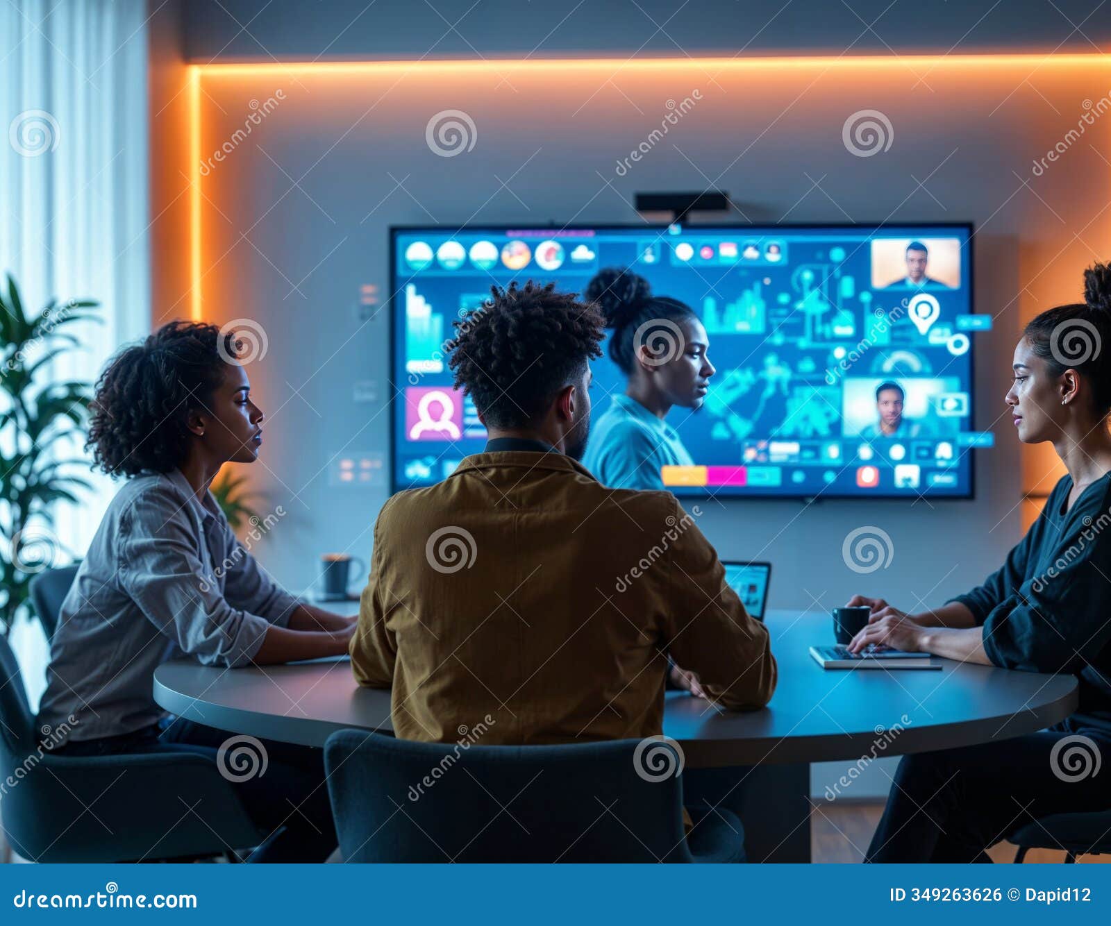 Business People Sitting Around a Table on Virtual Meeting in an Office ...