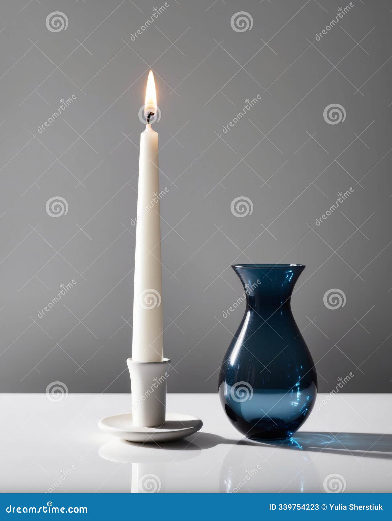 Candlelight and Reflection in Blue Glass. Stock Image - Image of ...