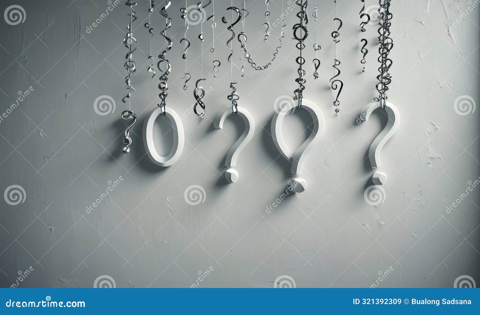 A White Question Mark is Hanging from a Chain on a Wall. Stock ...