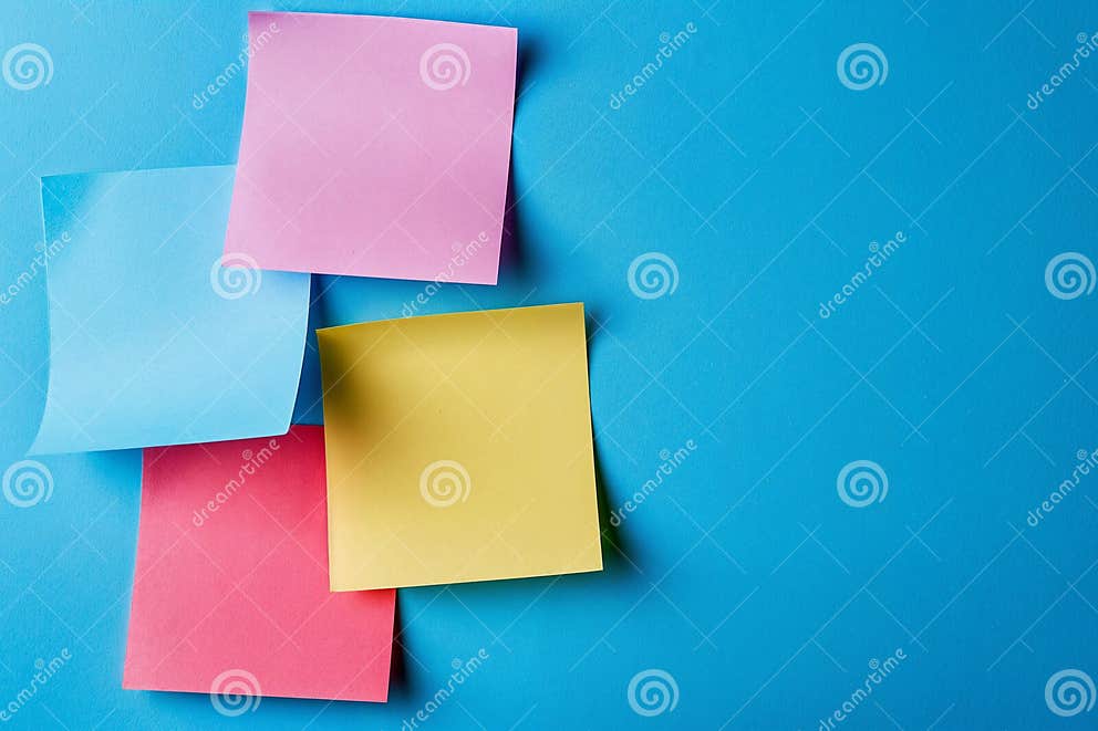 AI Generated Illustration of a Colorful Stack of Sticky Notes on a Blue ...