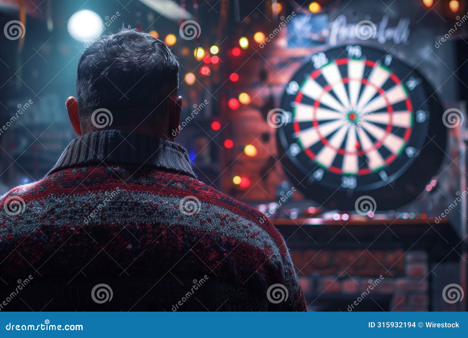 A man playing darts. stock photo. Image of socializing - 315932194