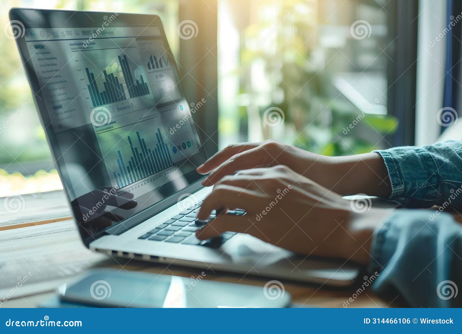 A Person Using a Laptop Computer with His Hands on the Keyboard Stock ...