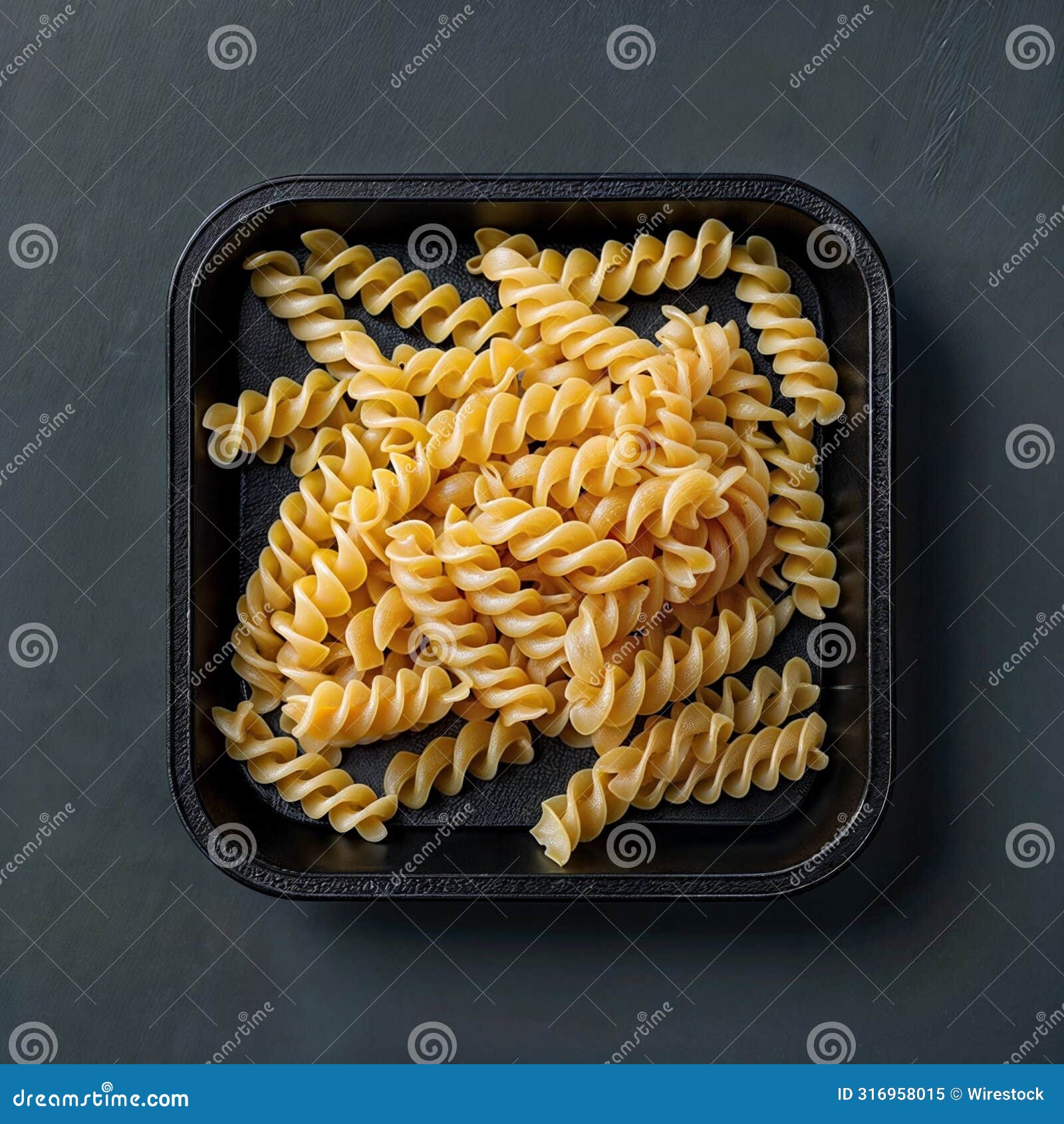 AI Generated Illustration of Yellow Macaroni in Plastic Tray on Table ...