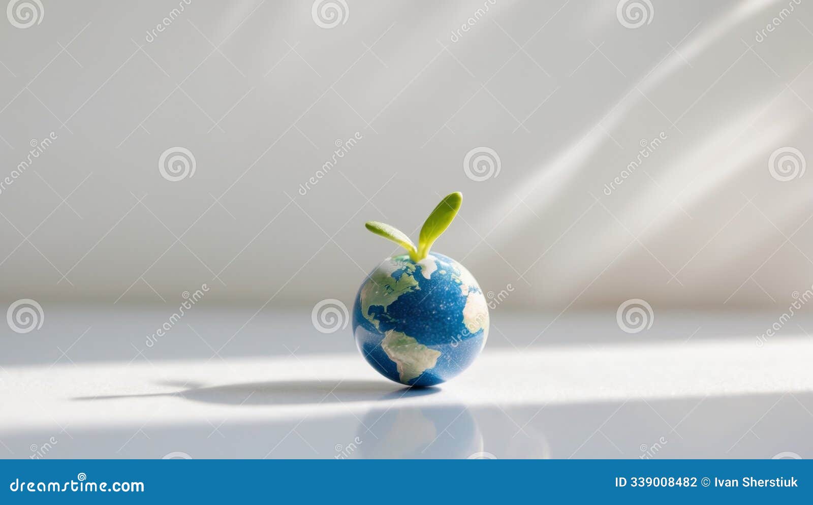 A Tiny Sprout Growing On A Miniature Earth. Royalty-Free Stock Image ...
