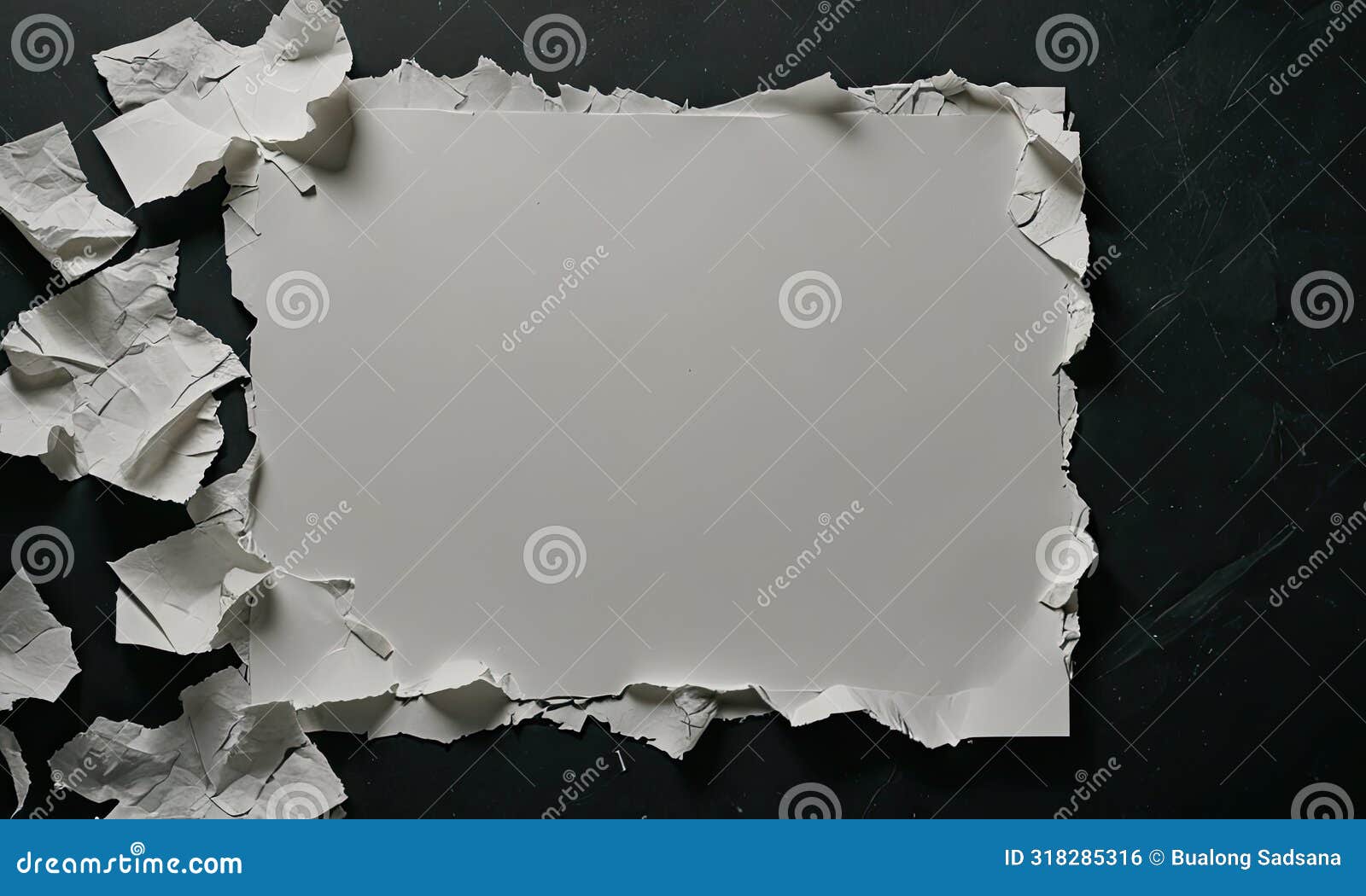 A White Piece of Paper is Torn into Pieces on a Black Surface. Stock ...