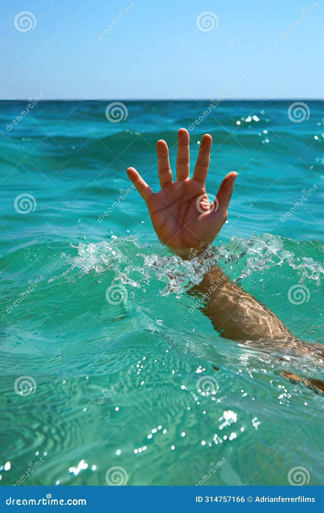 A Hand is in the Water, and it is Being Pulled Out of the Water Stock ...