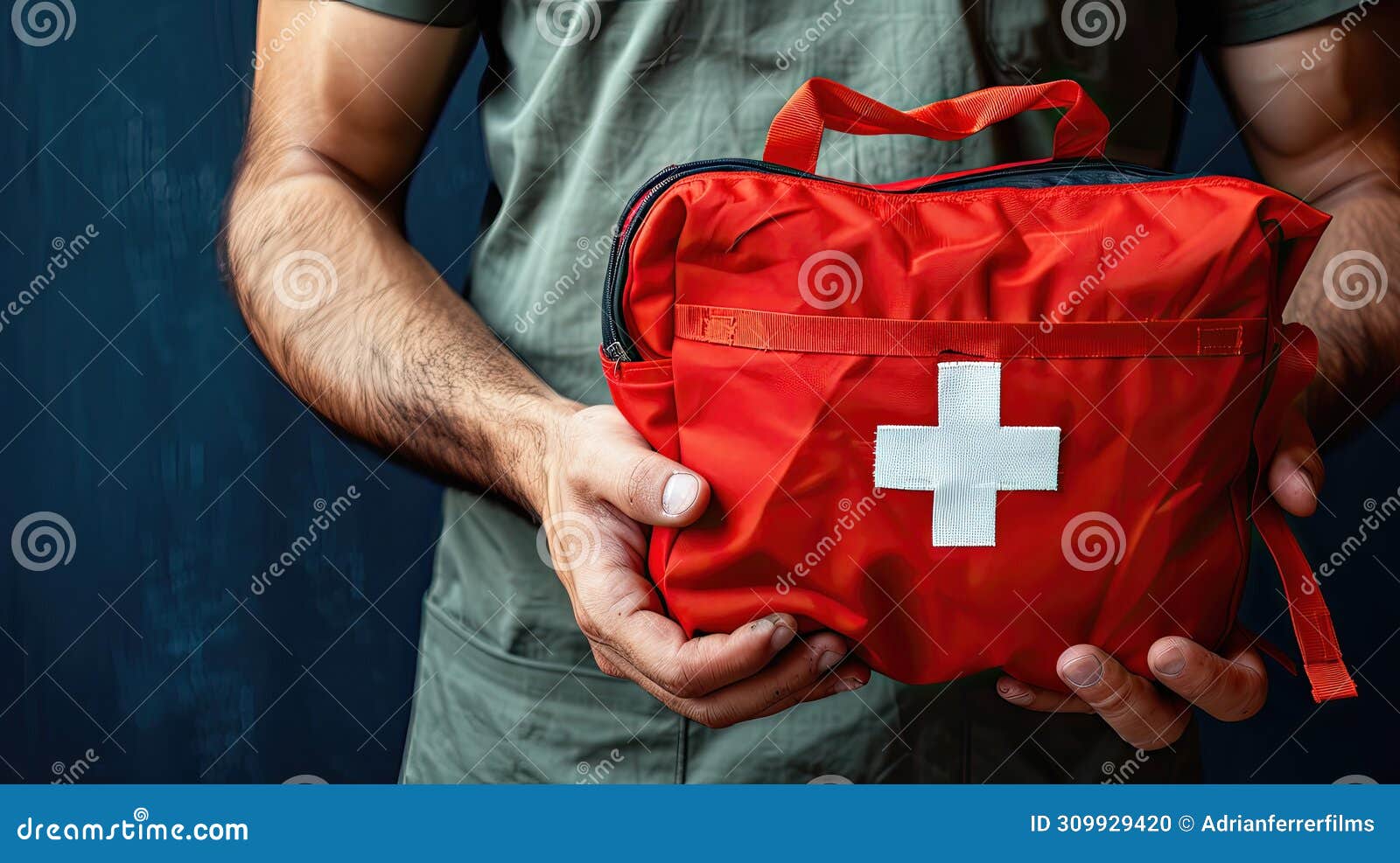 Man Presenting a Red First Aid Kit with a Confident Grip. Stock ...