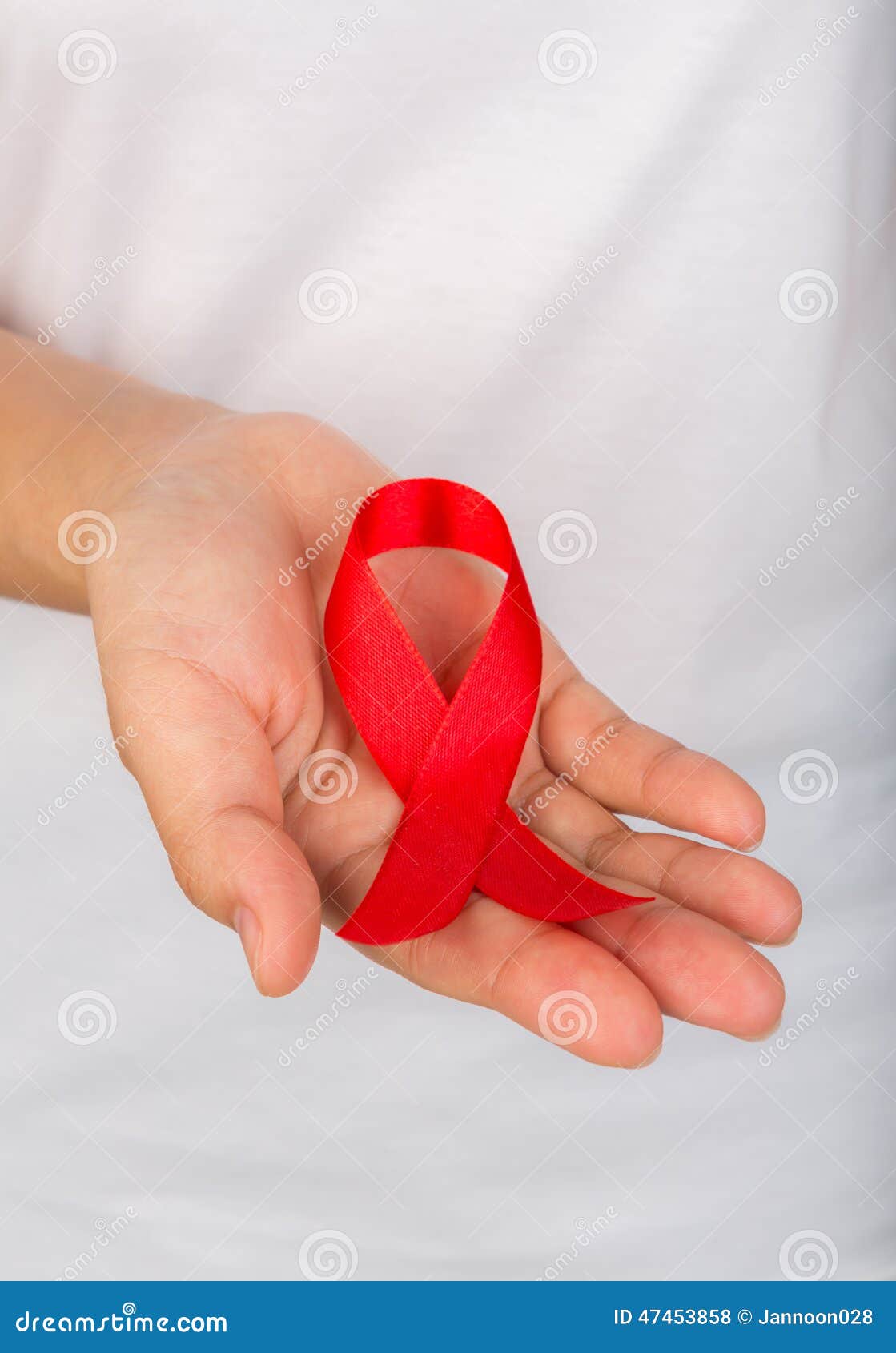AIDS ribbon in women hand stock photo. Image of health - 47453858