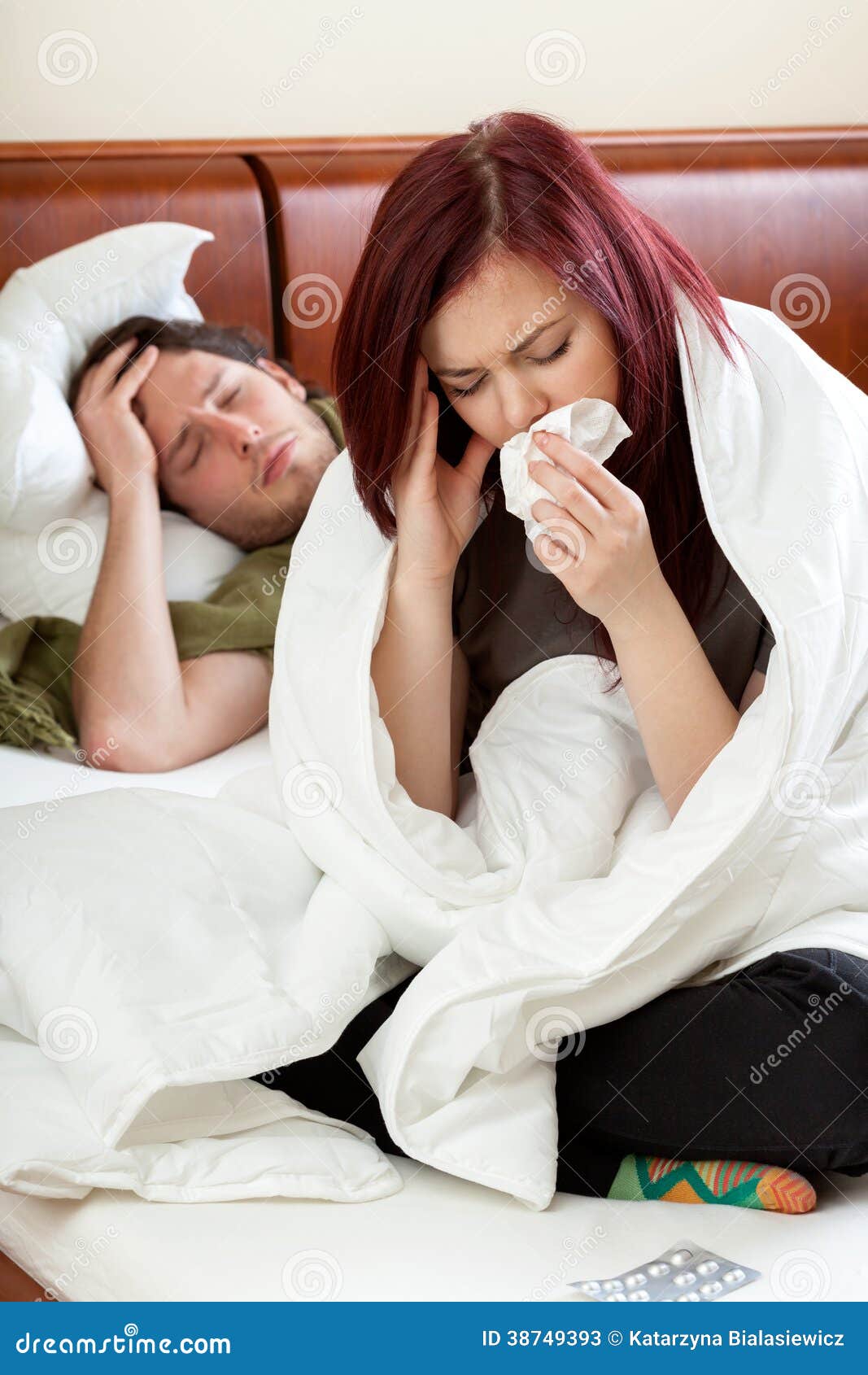 Ailing couple in bedroom stock image. Image of bedroom - 38749393