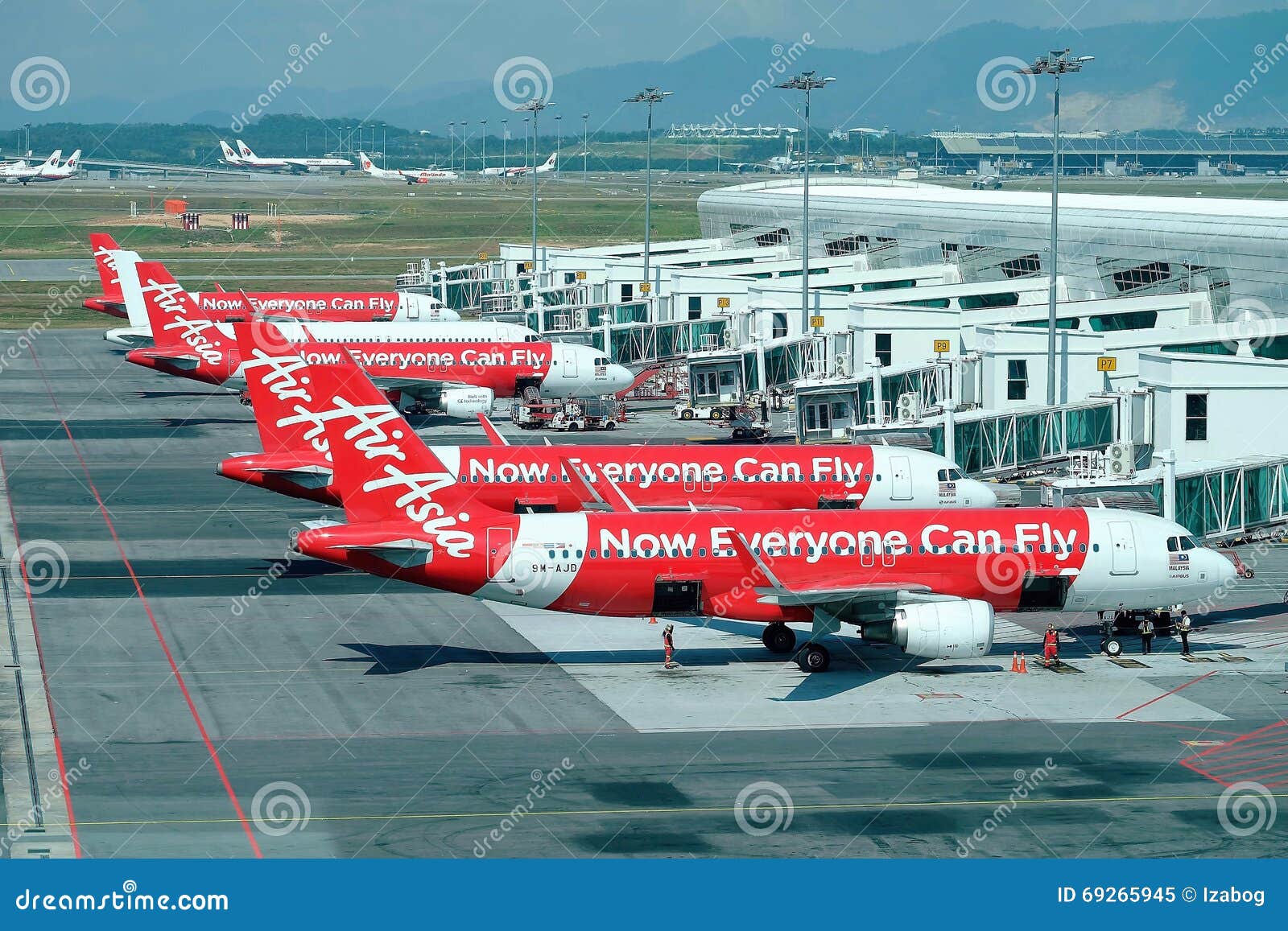 Airasia Planes Park At A Terminal At Jakarta Airport, Seen From A ... Airasia Planes Park At A Terminal At Jakarta Airport, Seen From A ...
