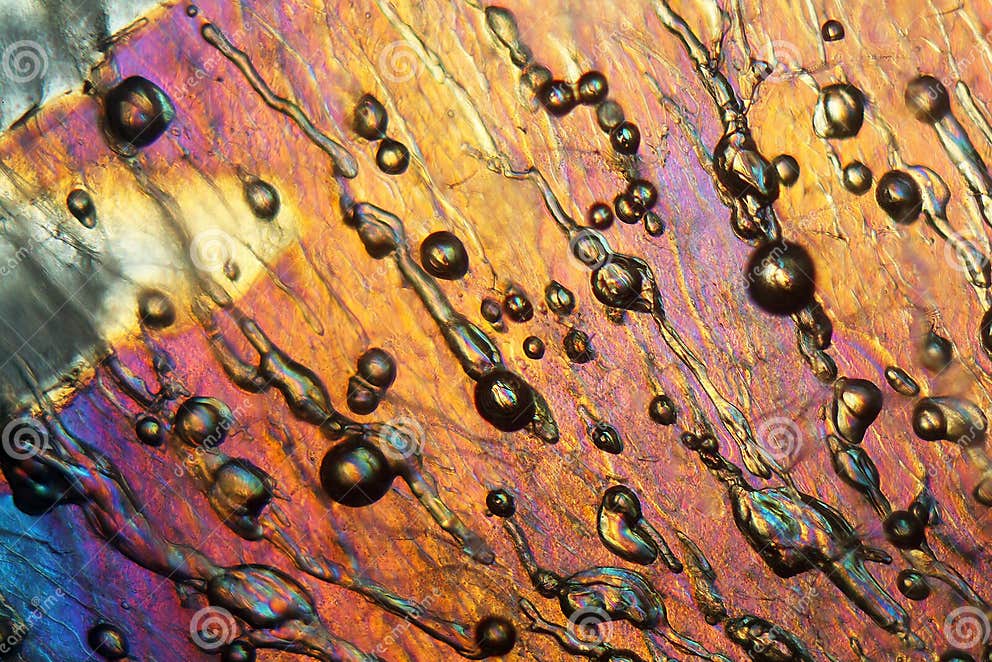 Air Bubbles in Ice Under the Microscope Stock Photo - Image of rainbow ...