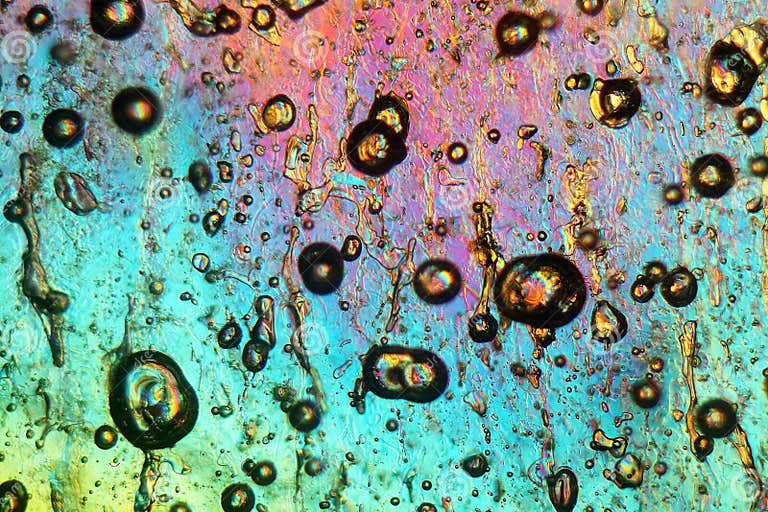 Air Bubbles in Ice Under the Microscope Stock Photo - Image of ...
