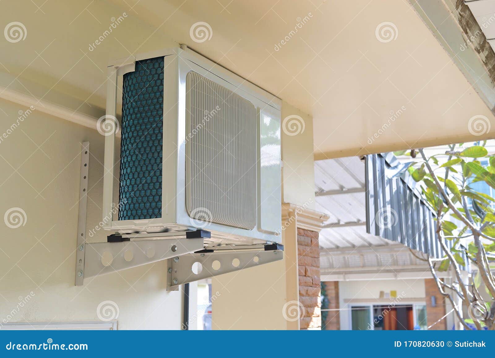 Air Compressor Conditioner Installing on Wall of Residential House ...