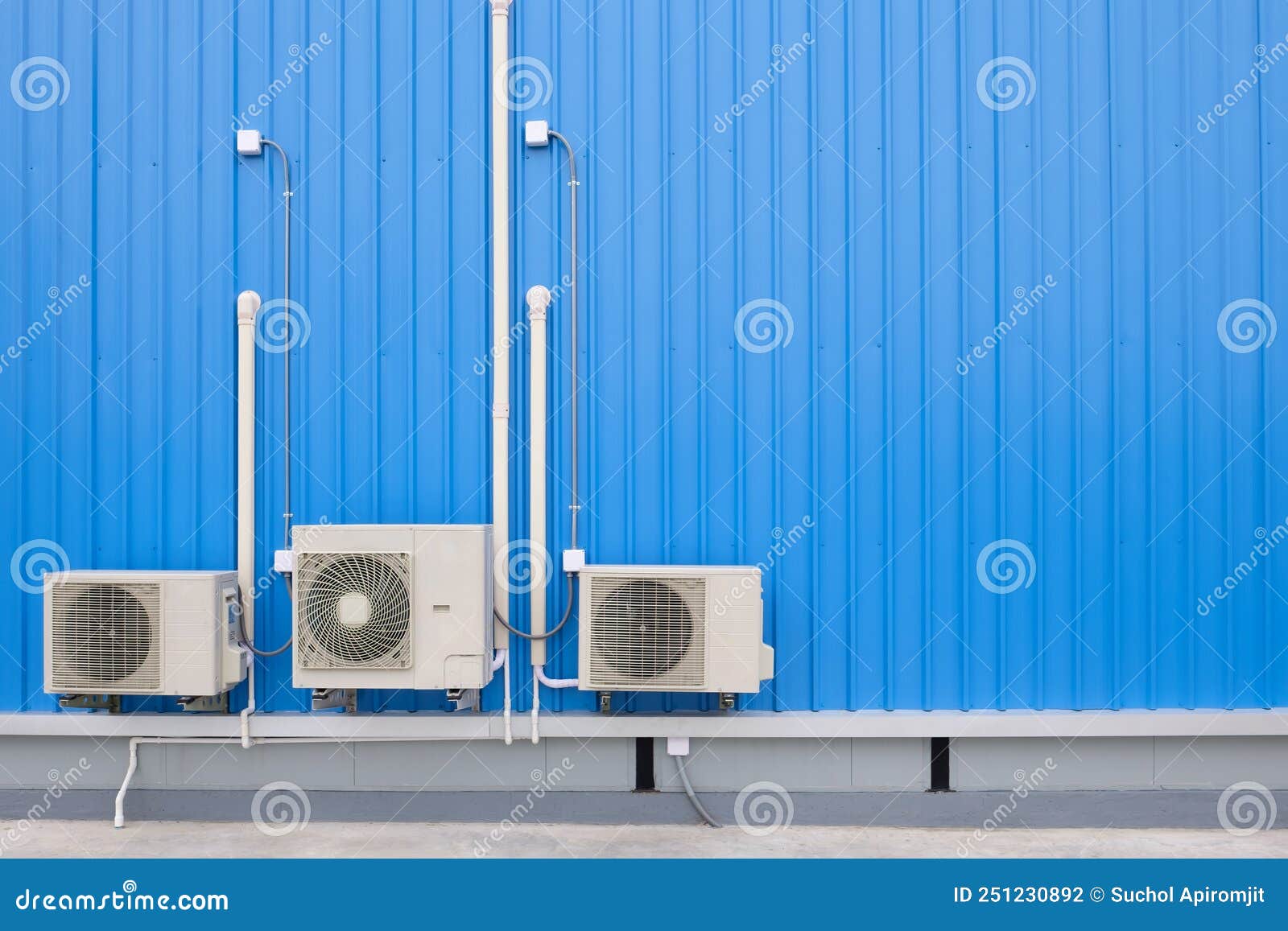 Air Compressor Installed on the Side of the Blue Building Stock Photo ...