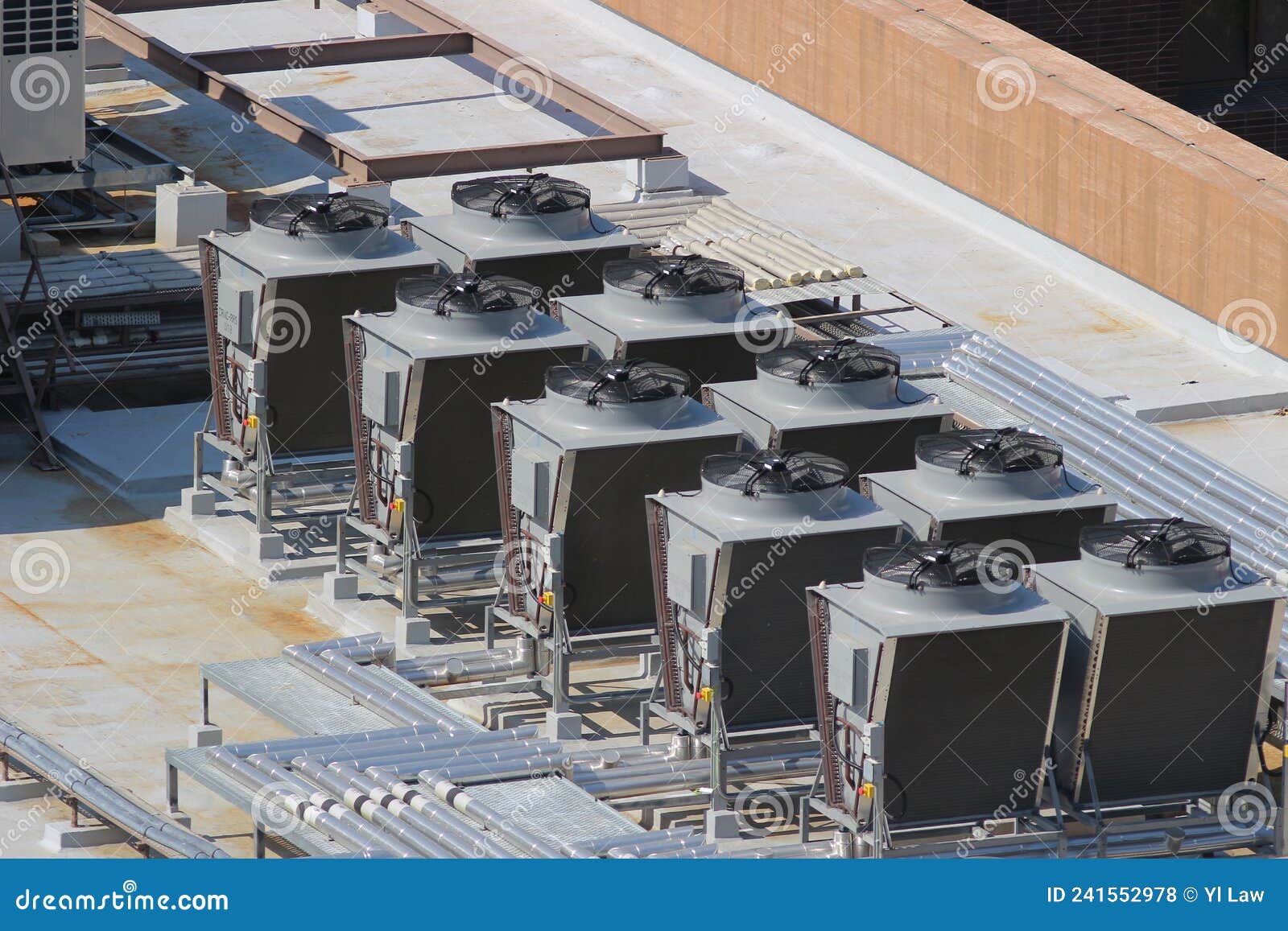 The Air Compressor Machine on Pedestal with Building Background ...