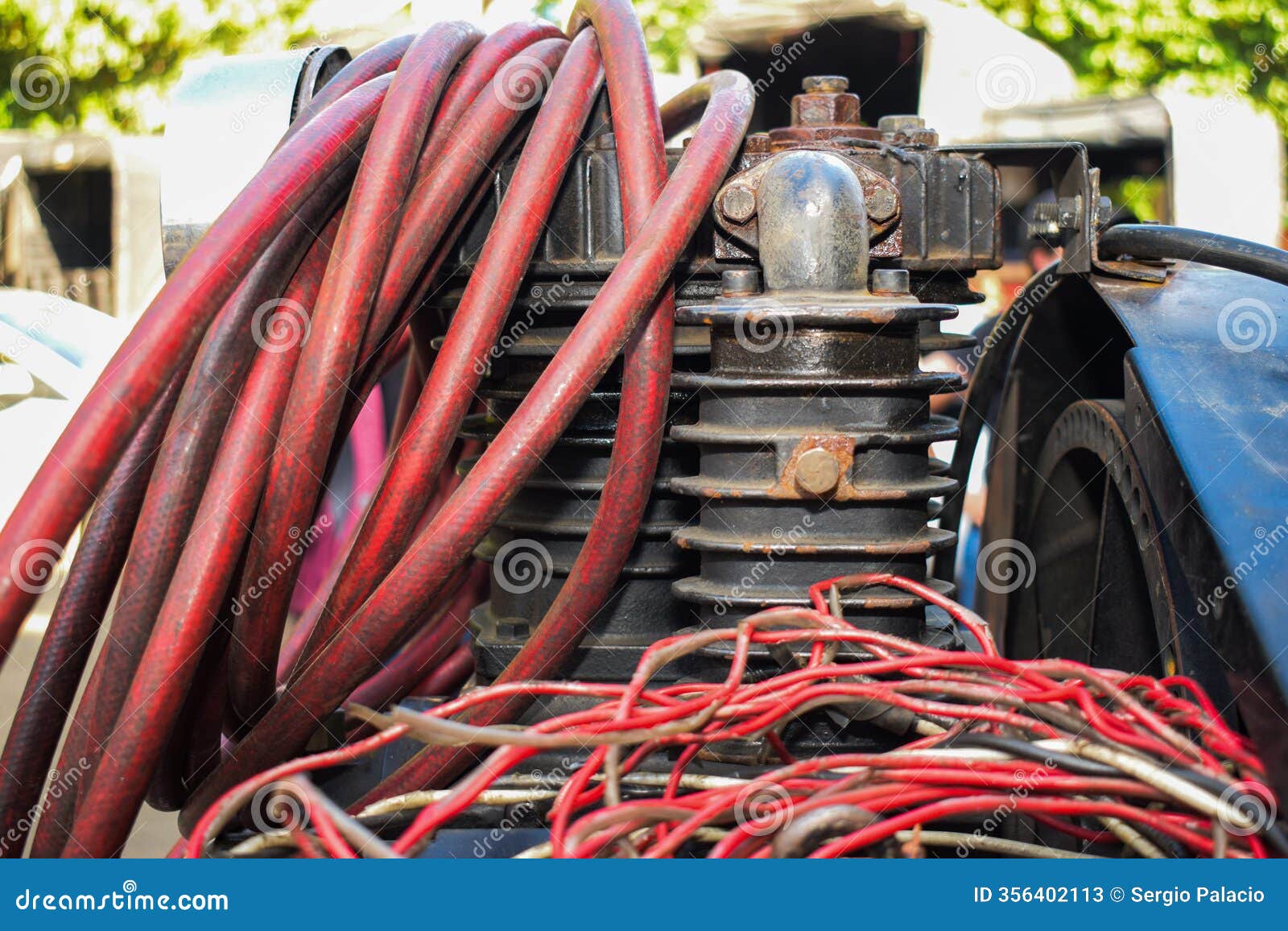 Air Compressor with Red Hoses and Electrical Cables Stock Image - Image ...