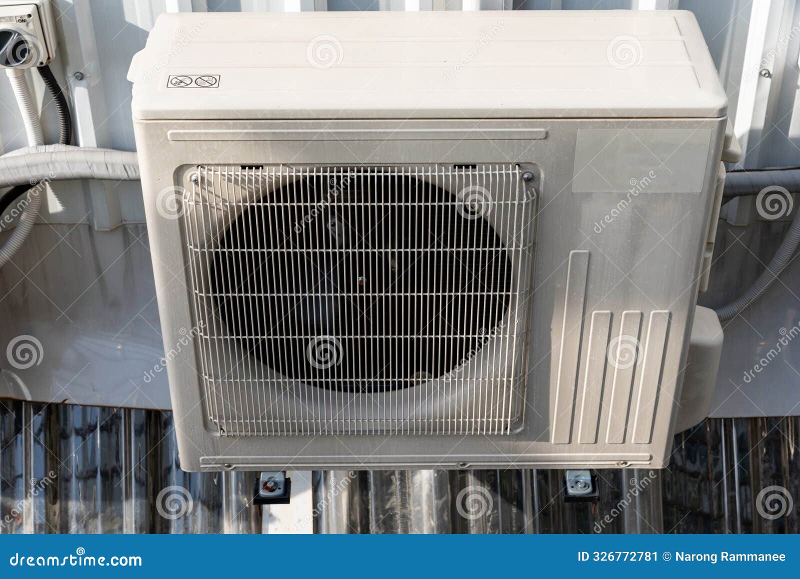 Air Compressor on the Wall of the Building Stock Image - Image of home ...