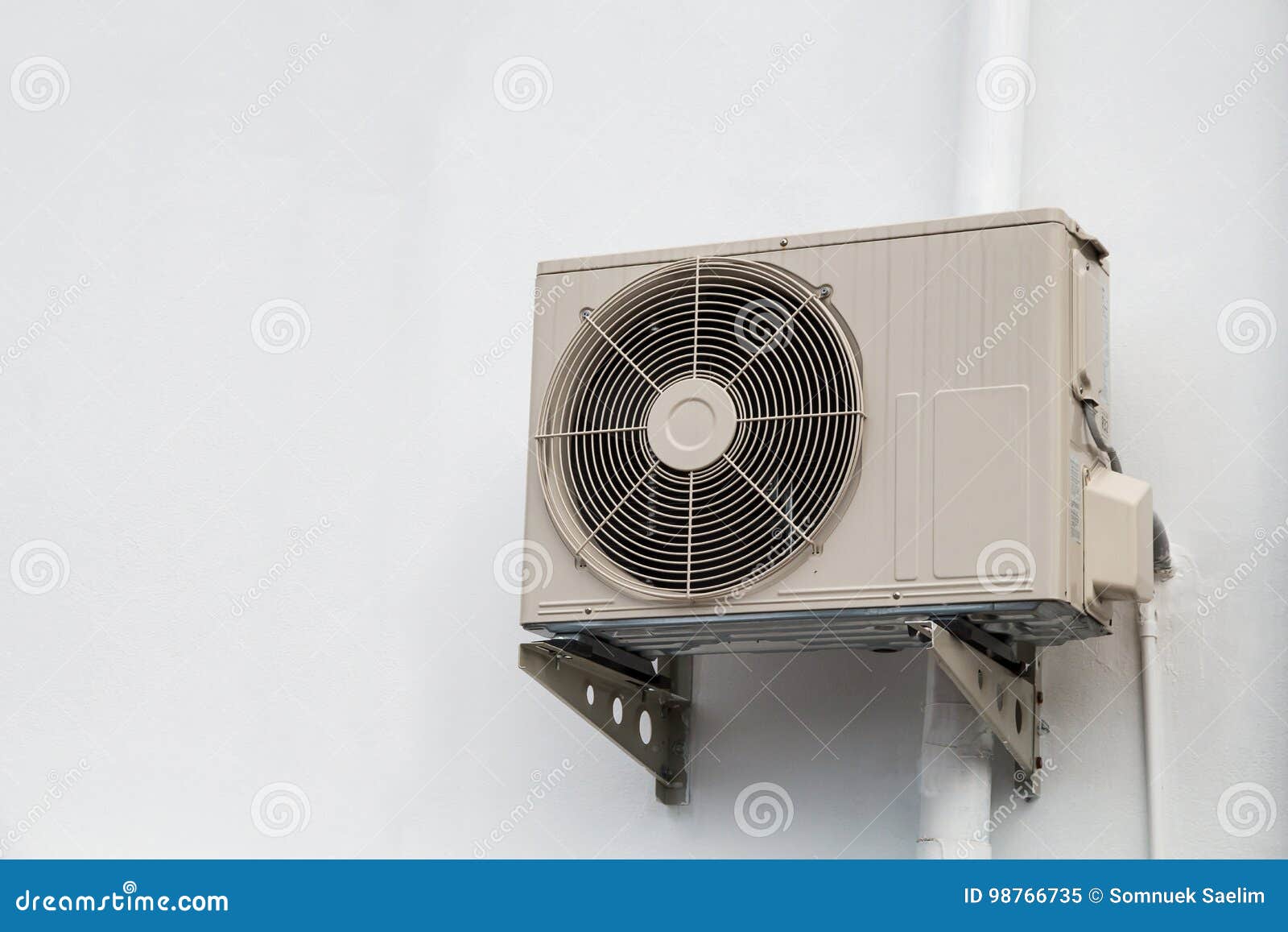 Air Compressor on Wall Pedestal with Siding Factory Wall Background ...