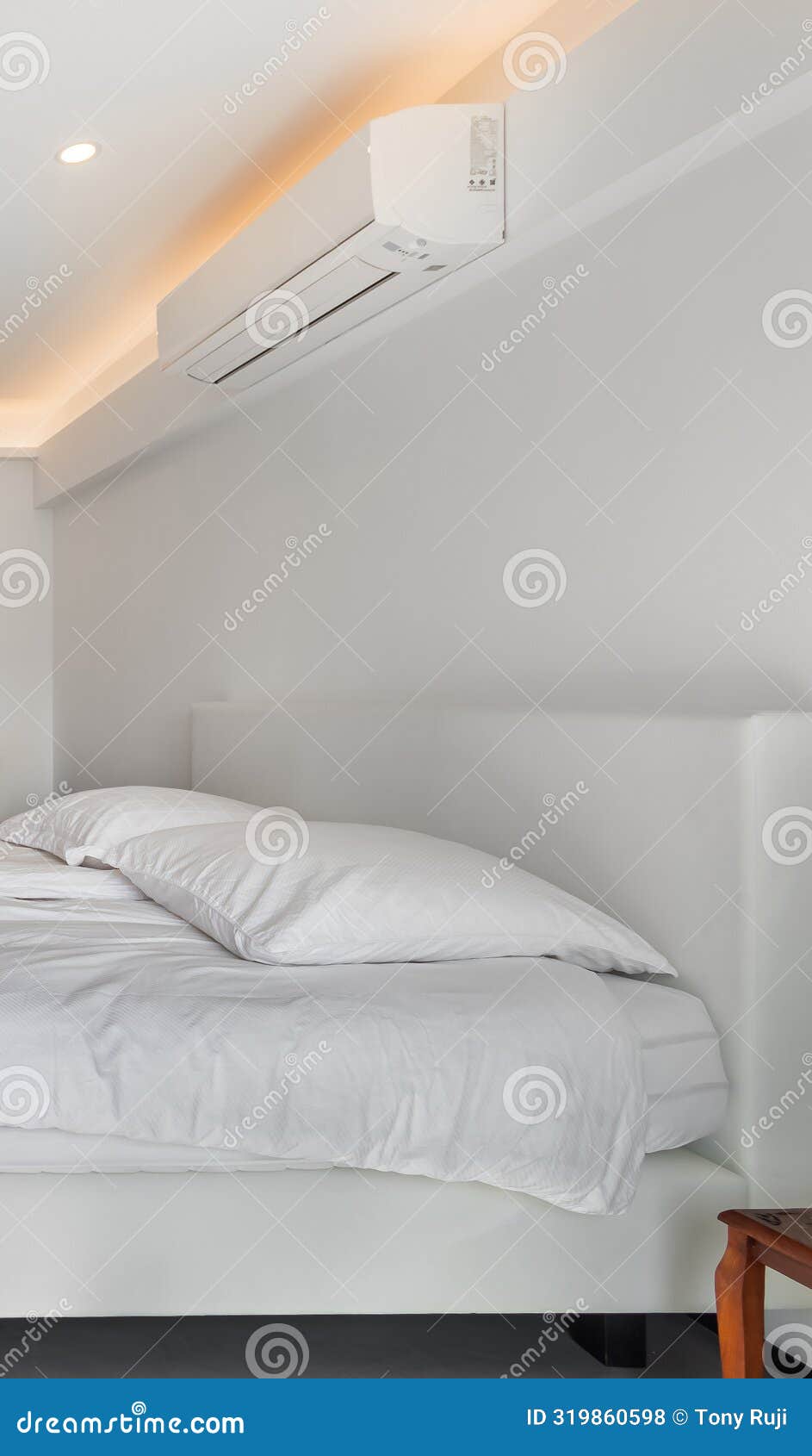 Air Conditioner and Bed in a White Minimal Style Room. Stock Photo ...