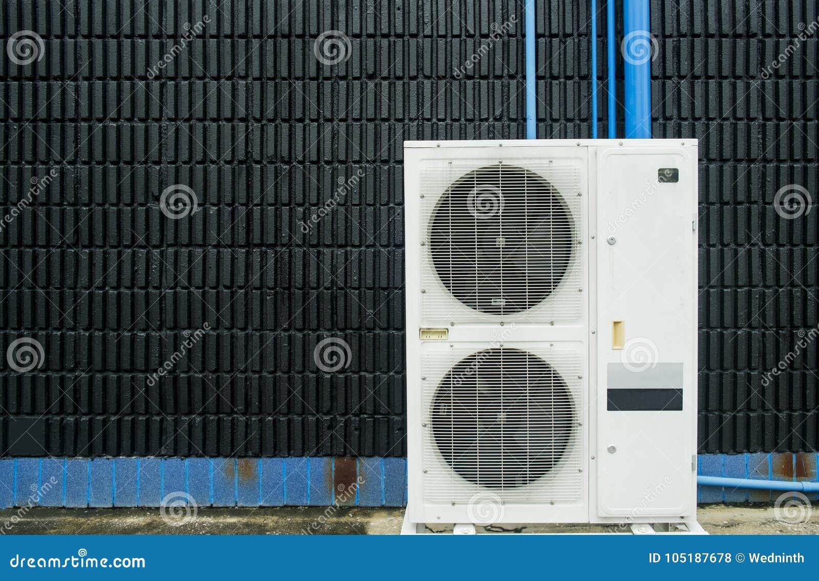 Air Conditioner Compressor Installed in Black Wall Building Stock Photo ...