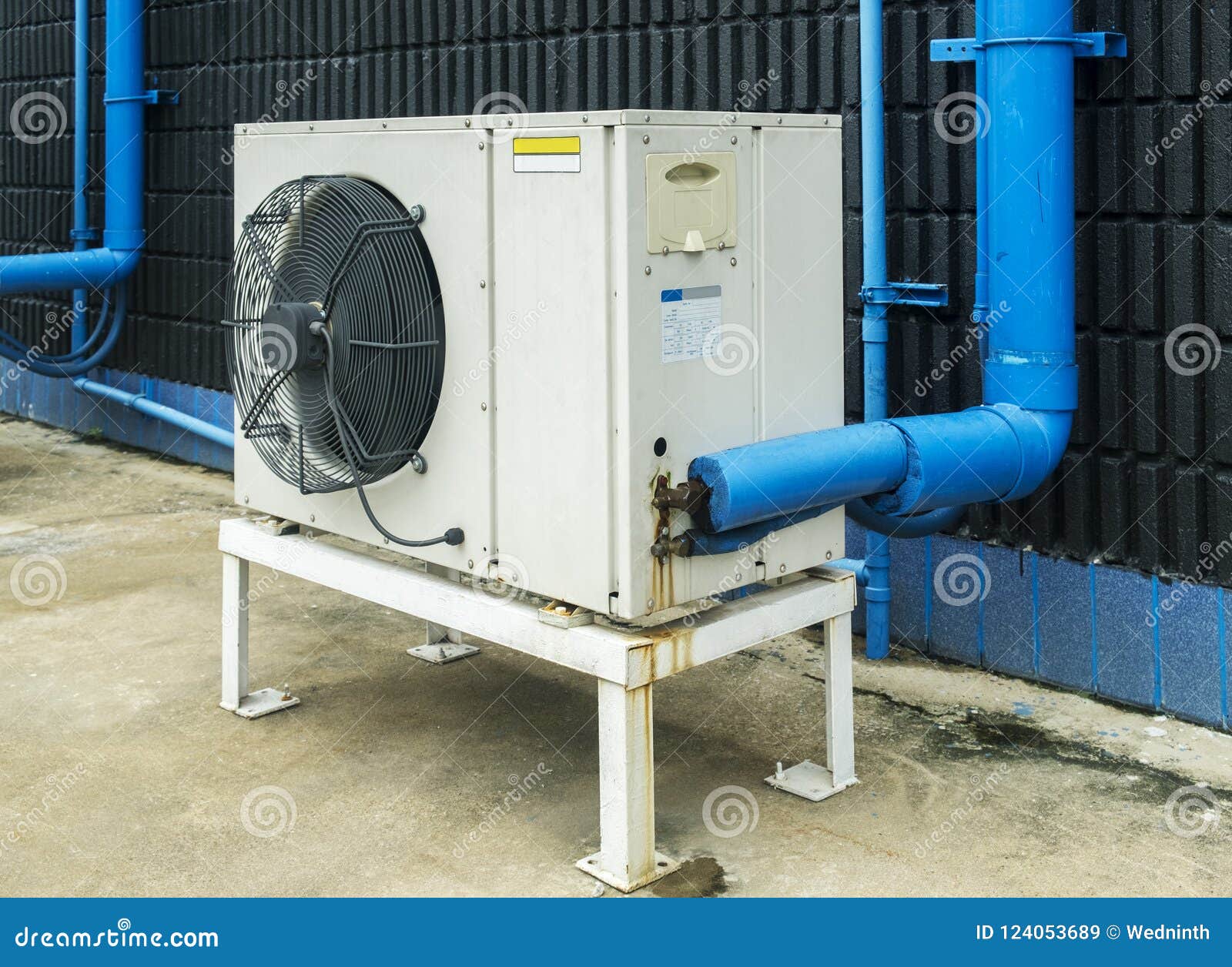 Air Conditioner Compressor Installed in Black Wall Building Stock Image ...