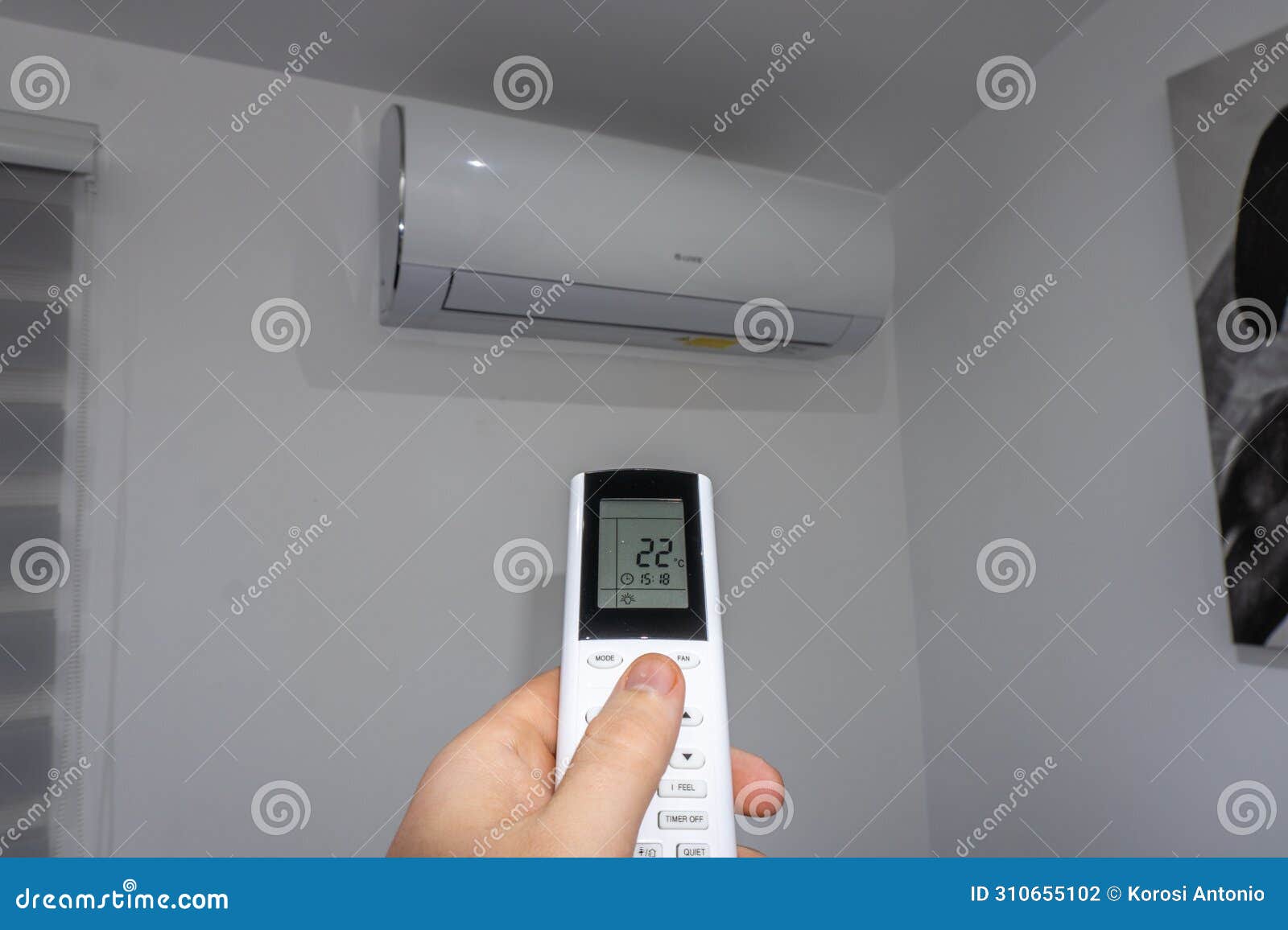 Air Conditioner Inside the Room Operating Remote Controller. Air ...