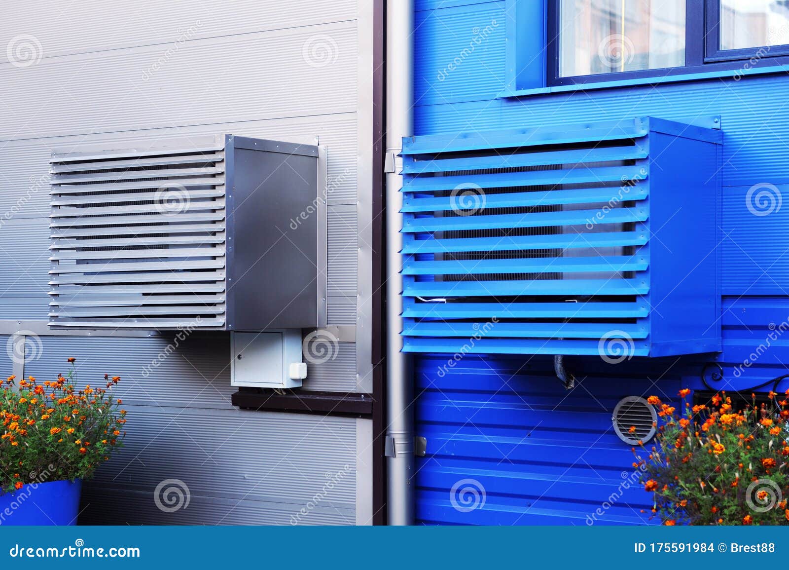 The Air Conditioner Installed on the Street is Protected by a Metal ...