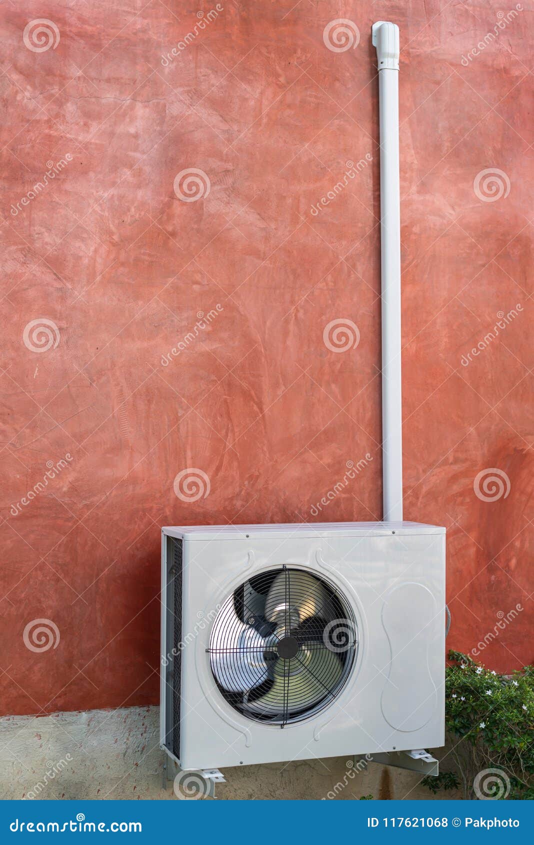 Air Conditioning Compressor Hanging on the Red Wall Stock Photo - Image ...