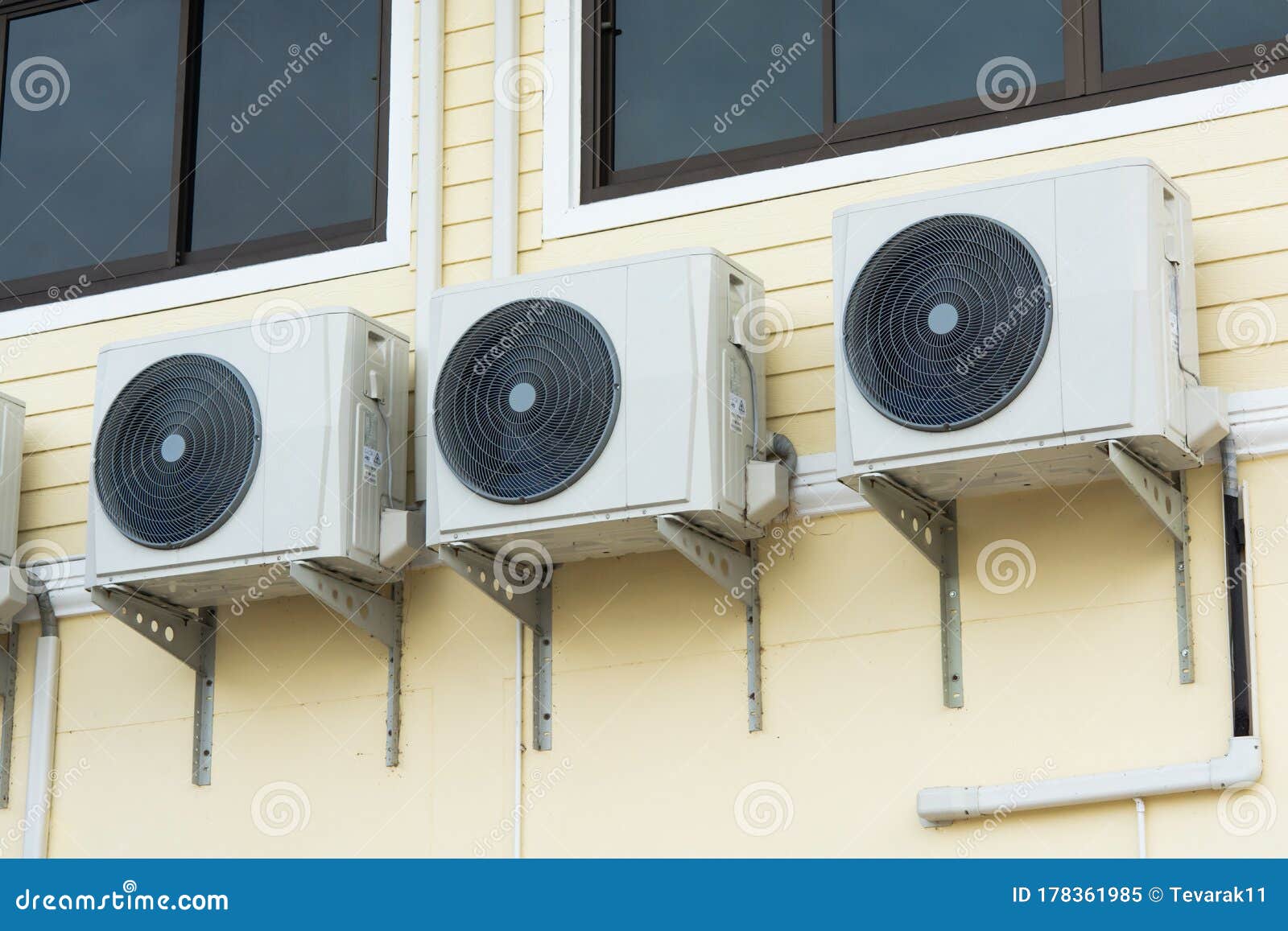 Air Conditioning Compressor Installed Outside the Wall of the House ...