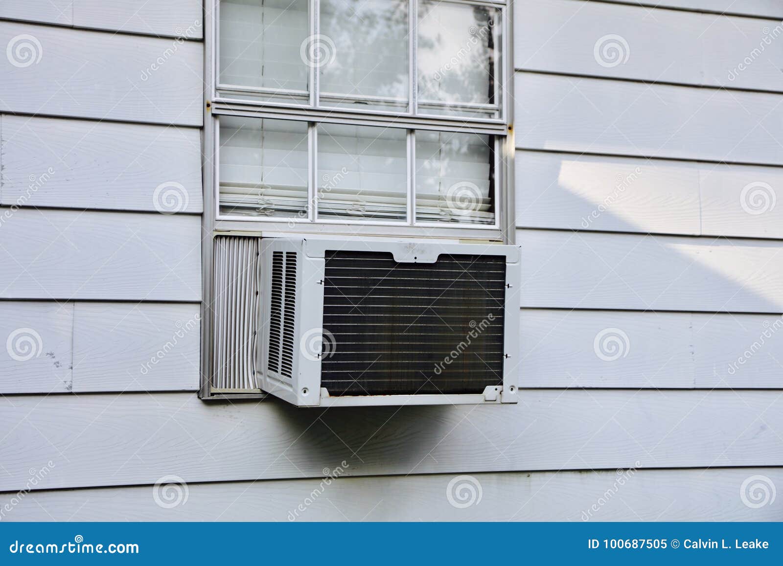 A Window And A Air Conditioner On The Grey Brick Wall Background ...
