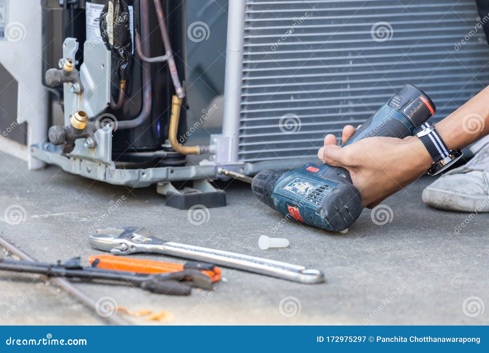 Air Conditioning Repair, Technician Man Hands Using a Screwdriver ...